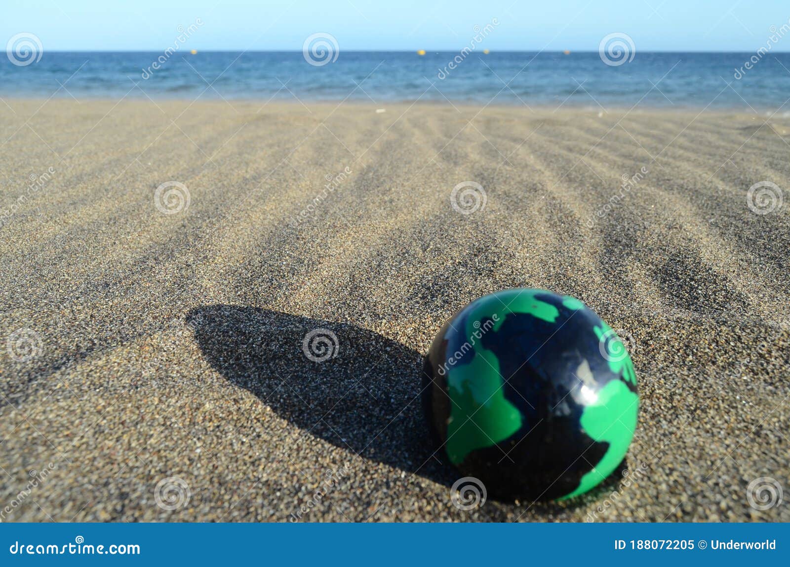Globe Earth on the Beach stock image. Image of travel - 188072205