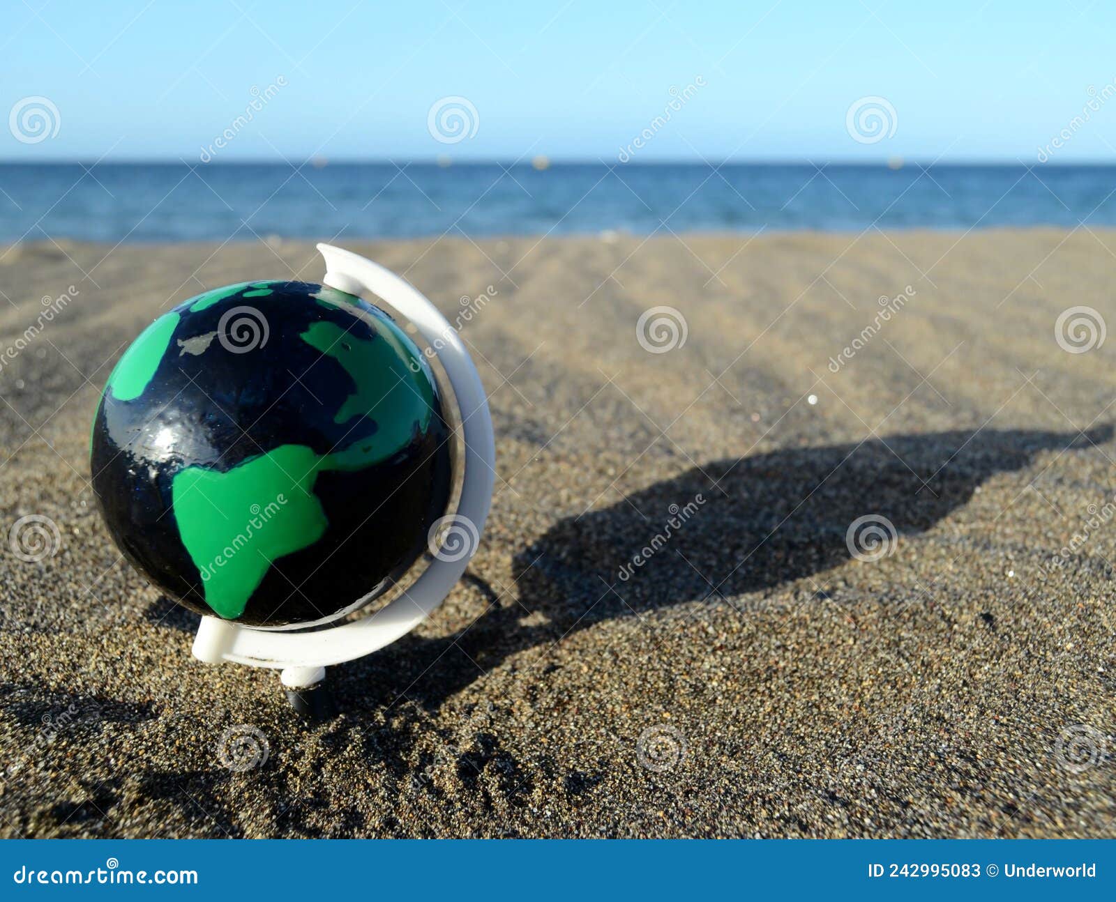 Globe Earth on the Beach stock image. Image of nature - 242995083