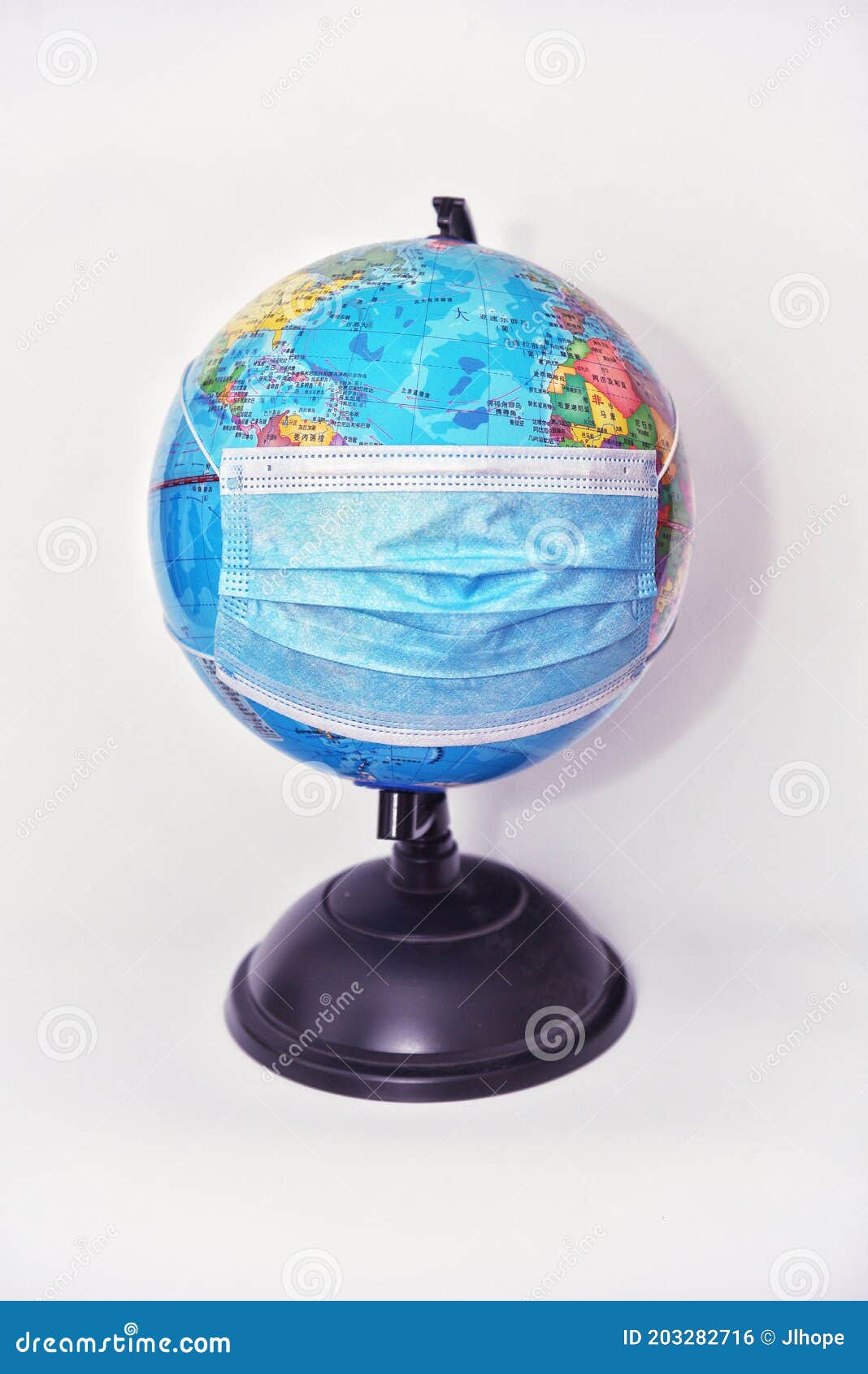 Globe with mask stock photo. Image of background, protection - 203282716