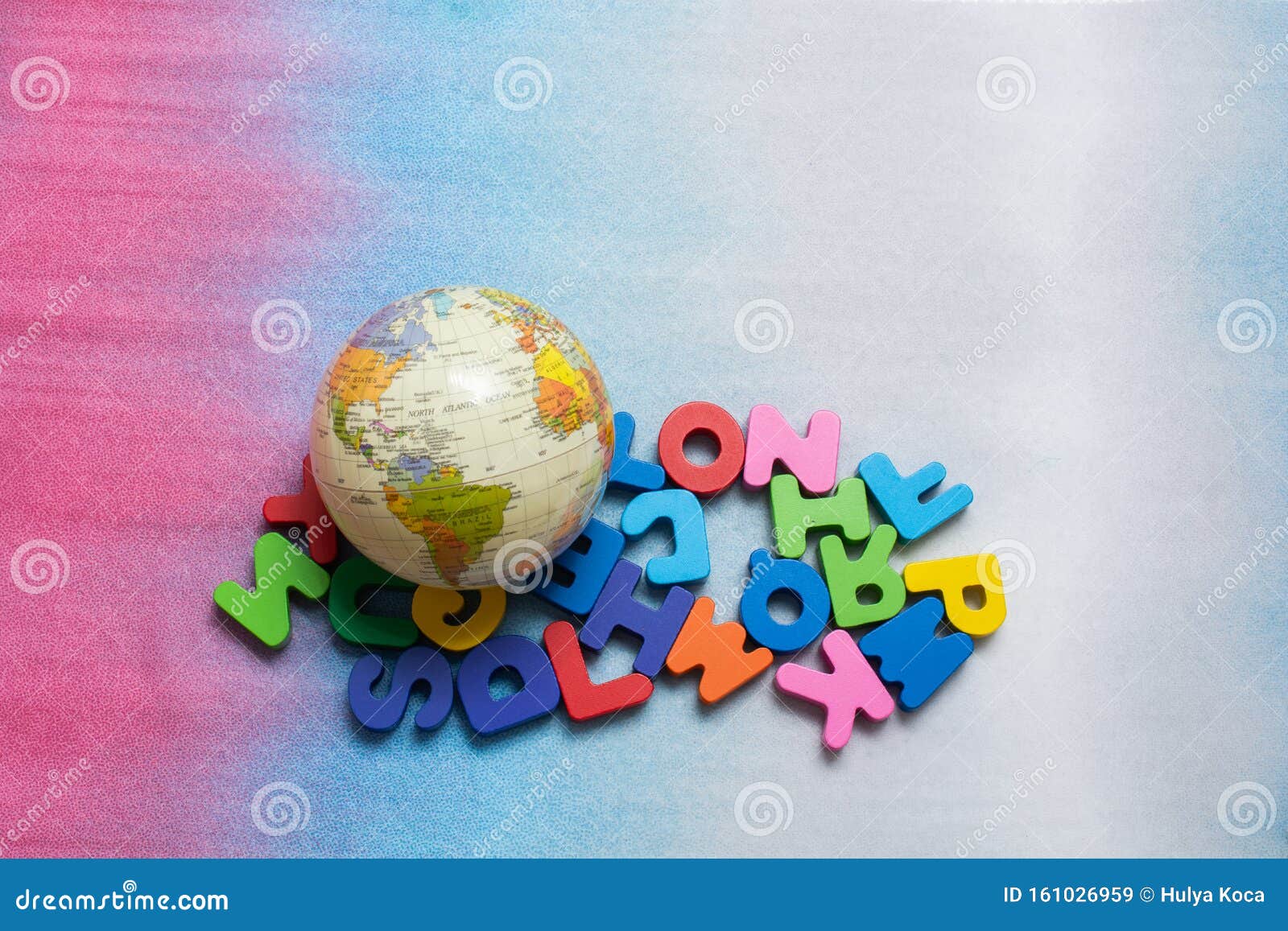 Globe Model on Colorful Letters on Colorful Background Stock Image ...