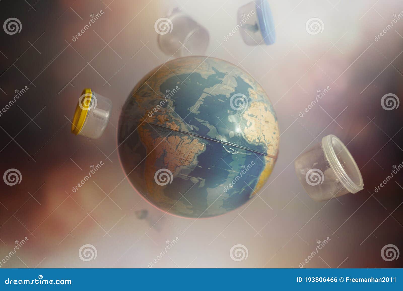 Globe of Planet Earth Surrounded by Plastic Bottles and Garbage.the ...