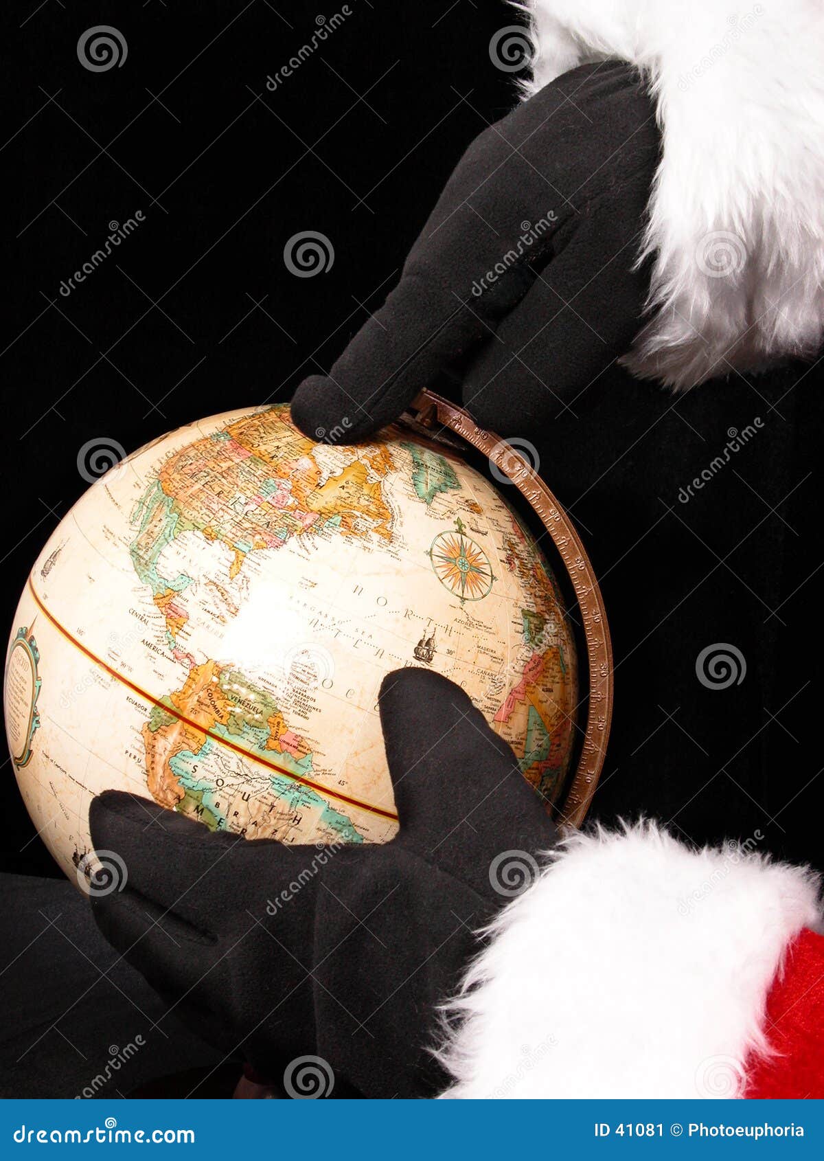 Globe with Santa a Hands Pointing the Way Stock Image - Image of plans ...