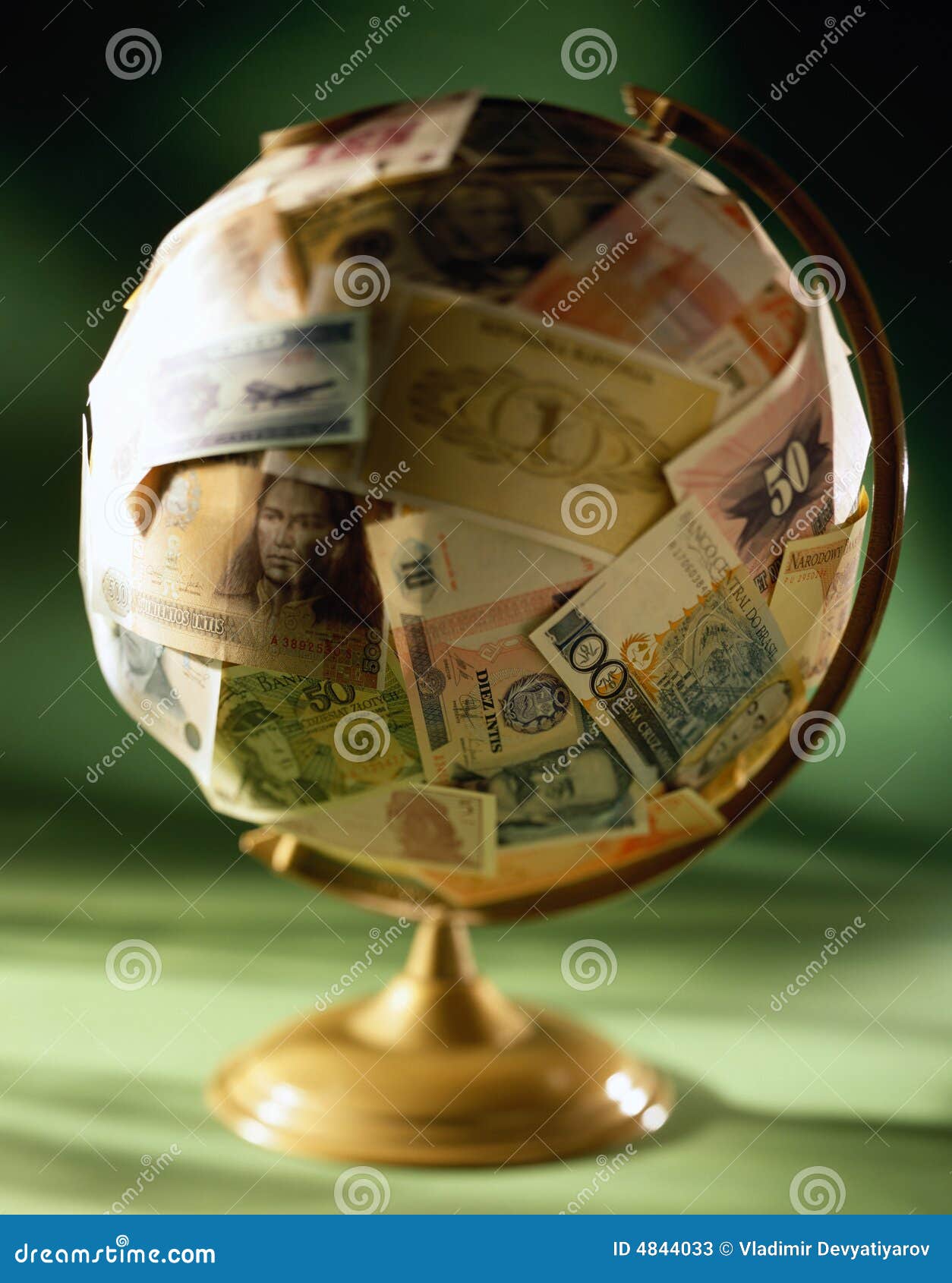Globe on soft money glue stock image. Image of globe, stand - 4844033