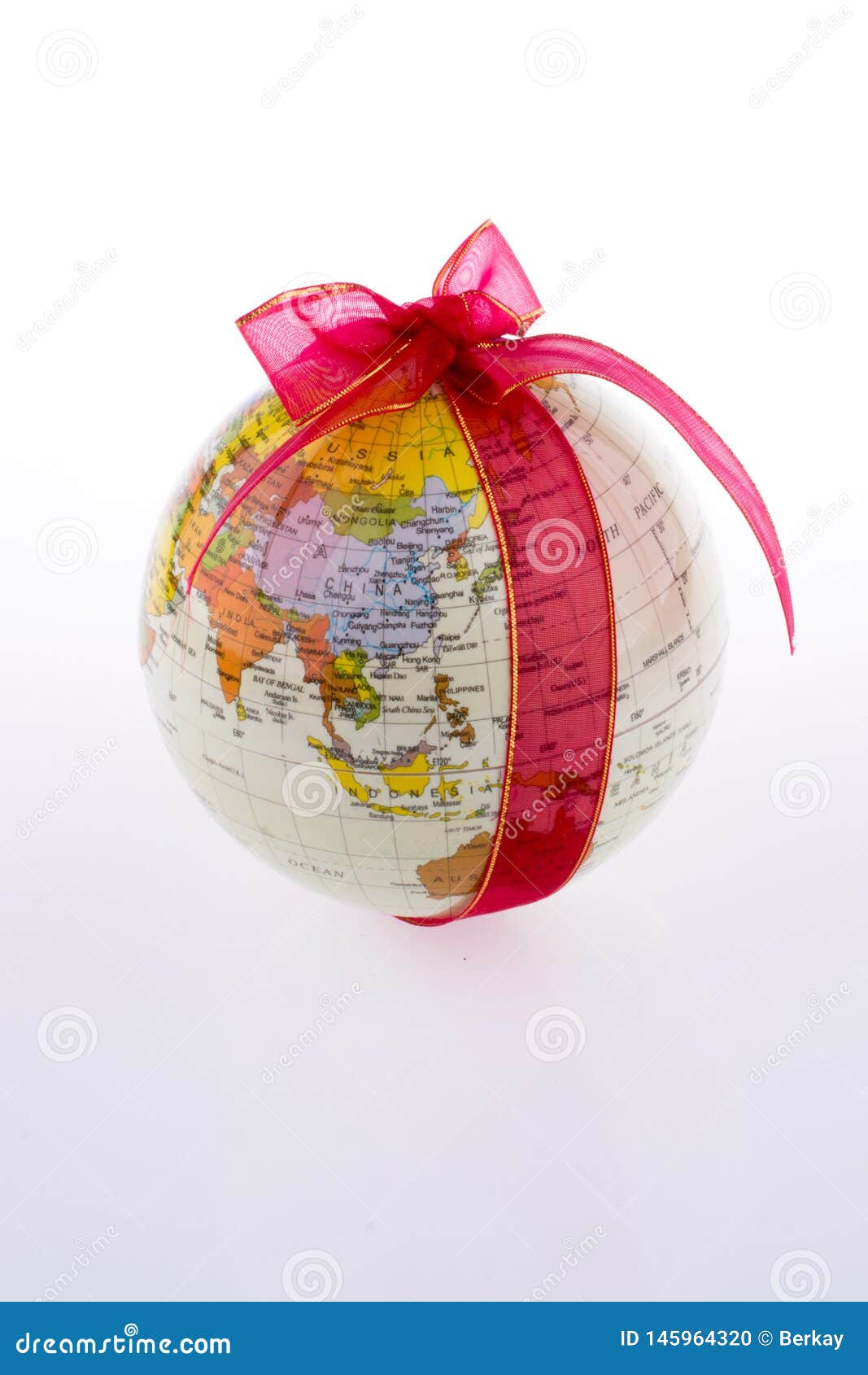 Globe tied with ribbon stock photo. Image of abstract - 145964320