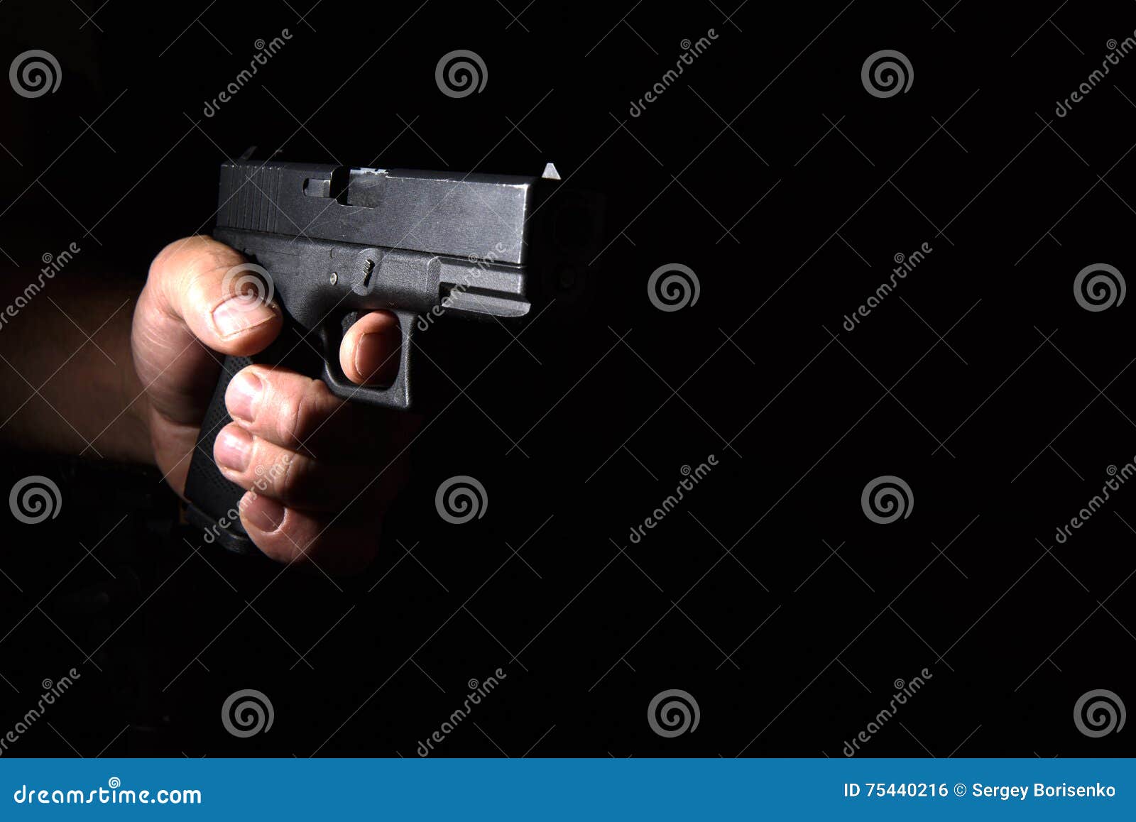 Glock pistol in his hand stock photo. Image of barrel - 75440216