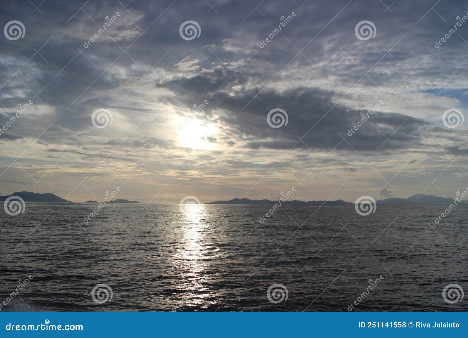 A gloomy sunset and sky stock photo. Image of ocean - 251141558