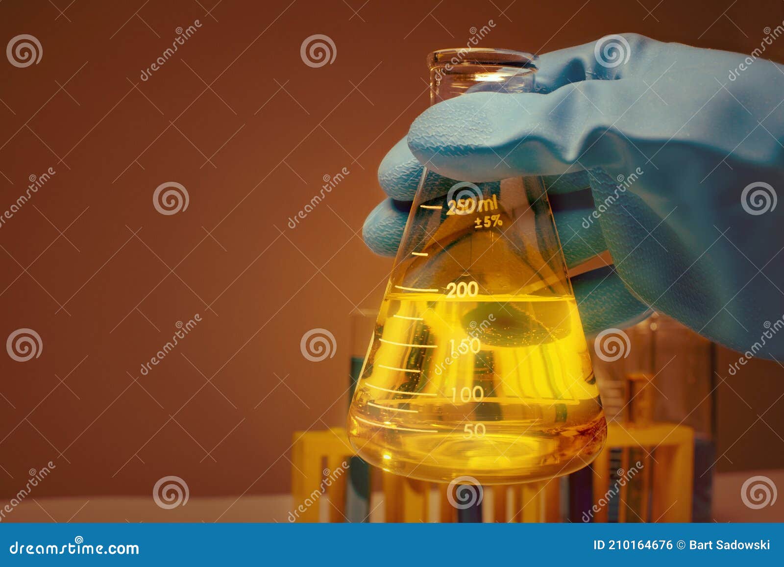 Chemistry Experiment with Hand Holding a Beaker Stock Photo - Image of ...