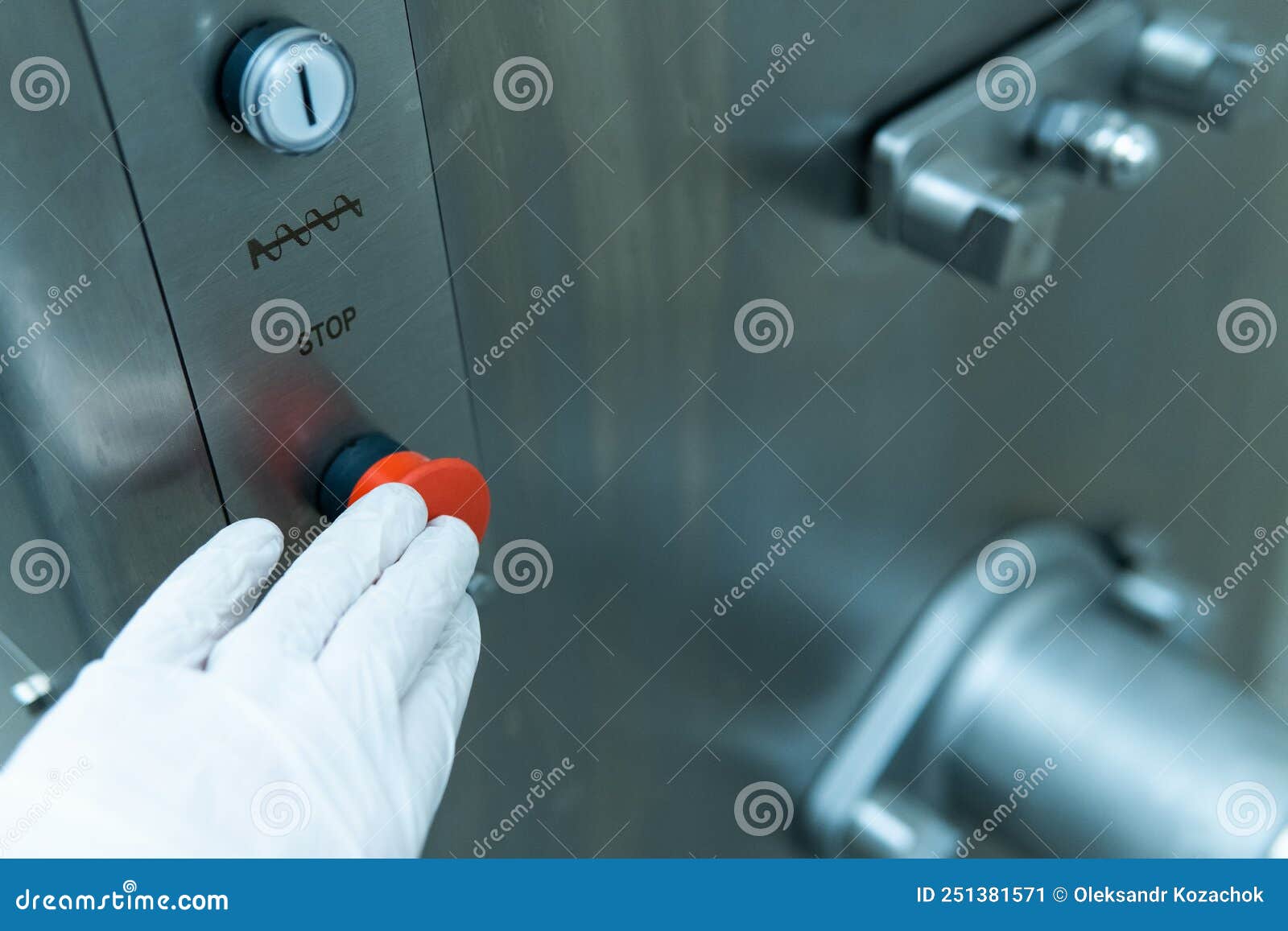 A Gloved Hand Presses a Button - Stop the Production Process Stock ...
