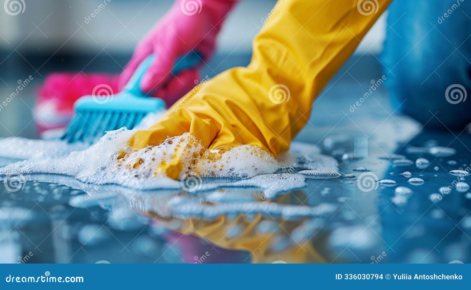 A Gloved Hand Scrubs a Surface with a Cleaning Solution, Creating Soapy ...