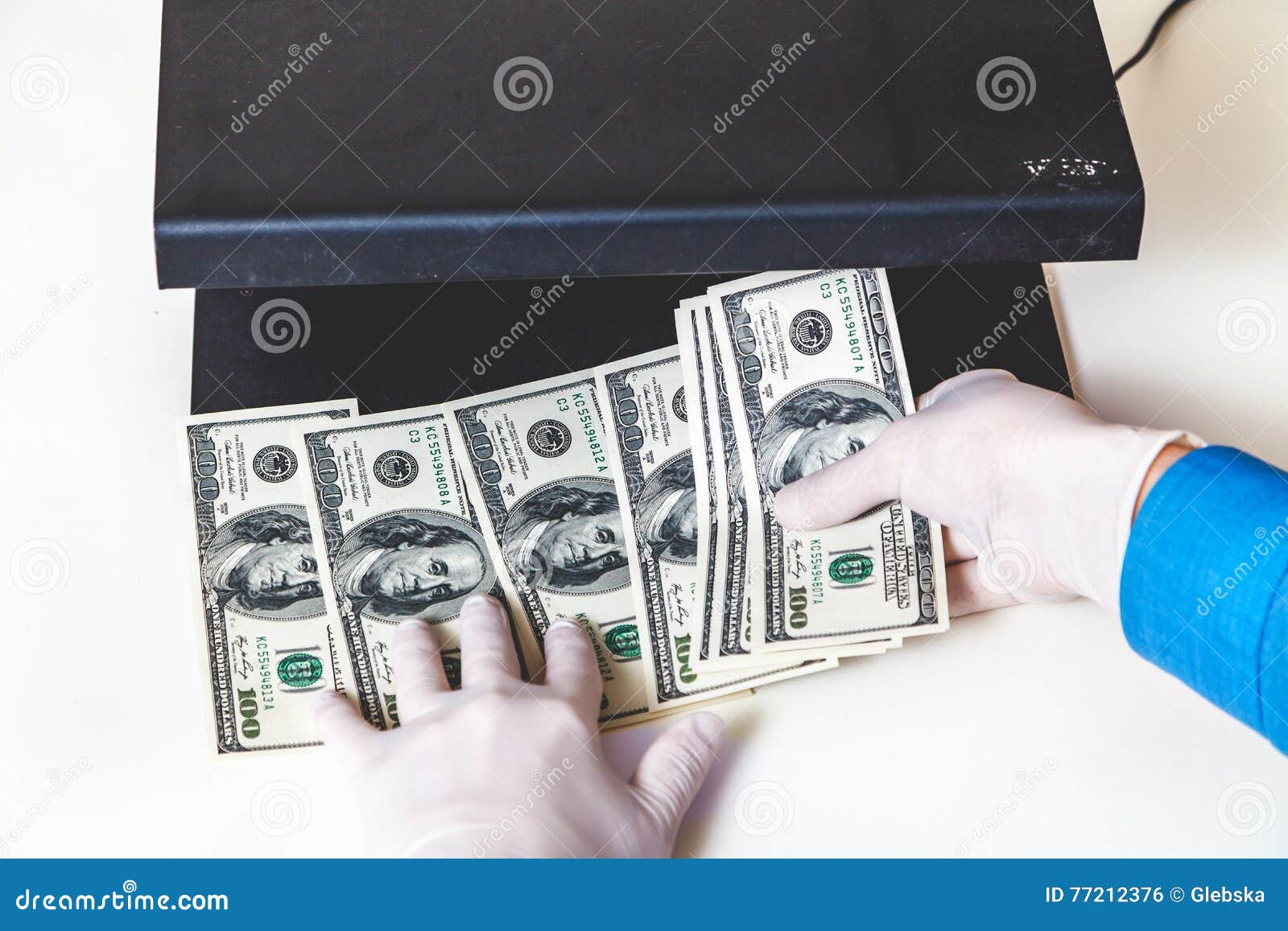 Gloved Hands Check Dollar Bills on the Detector Stock Photo - Image of ...