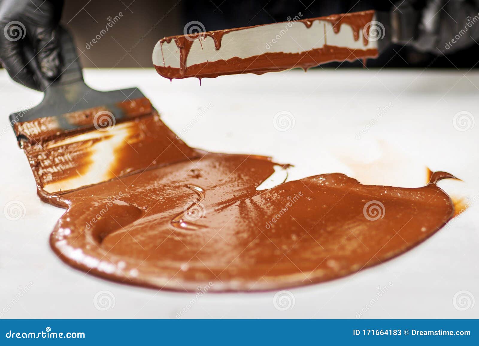 Confectioner in Gloves Makes Chocolates in Forms Stock Image - Image of ...