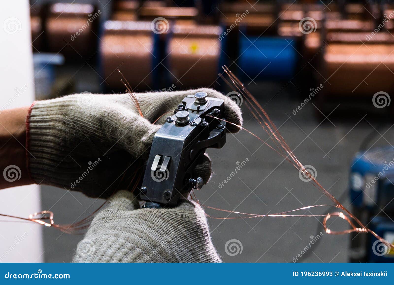 Gloved Hands Connect the Copper Cable To the Core with a Special Tool ...