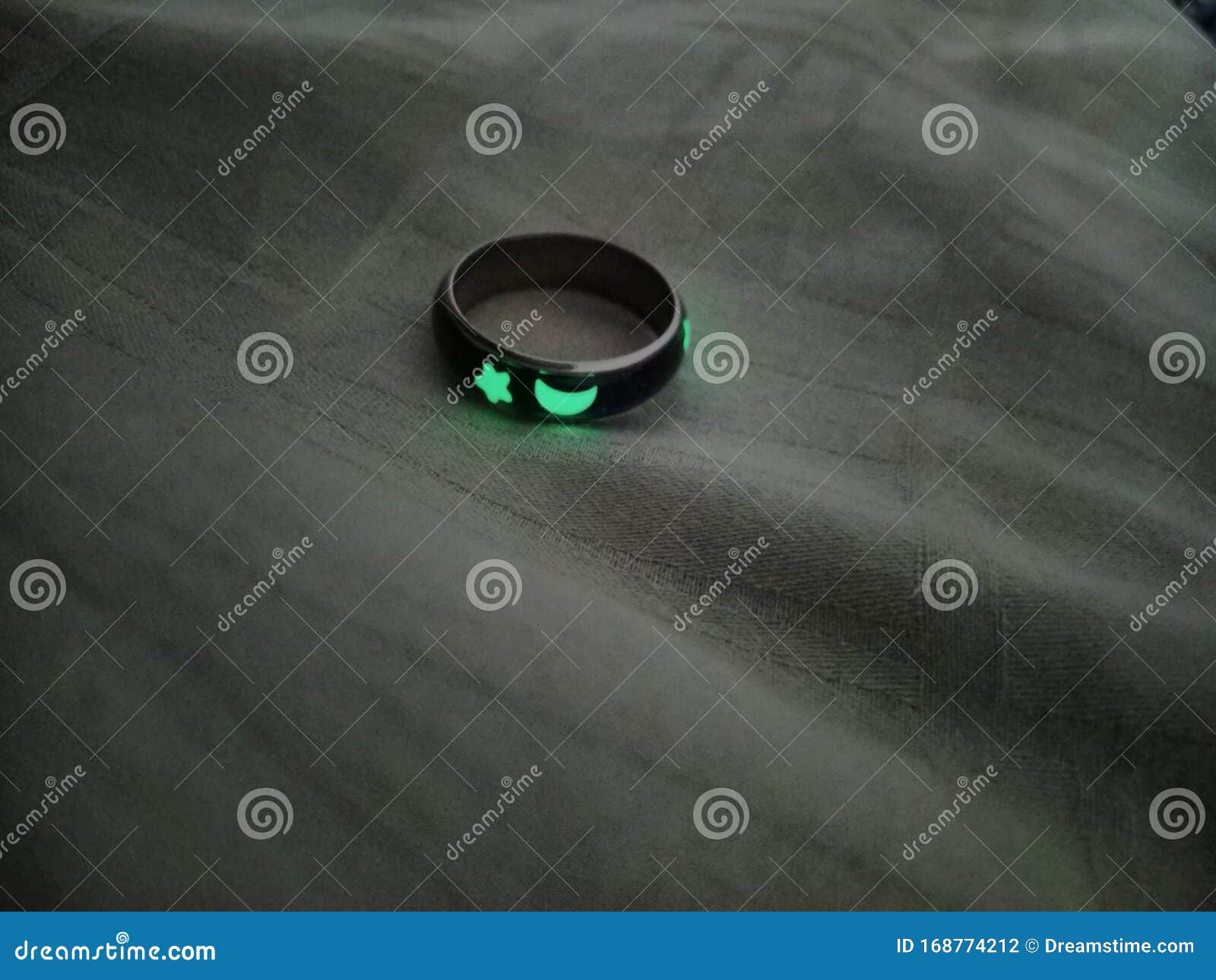 Glow in the Dark Mood Ring stock photo. Image of ring - 168774212