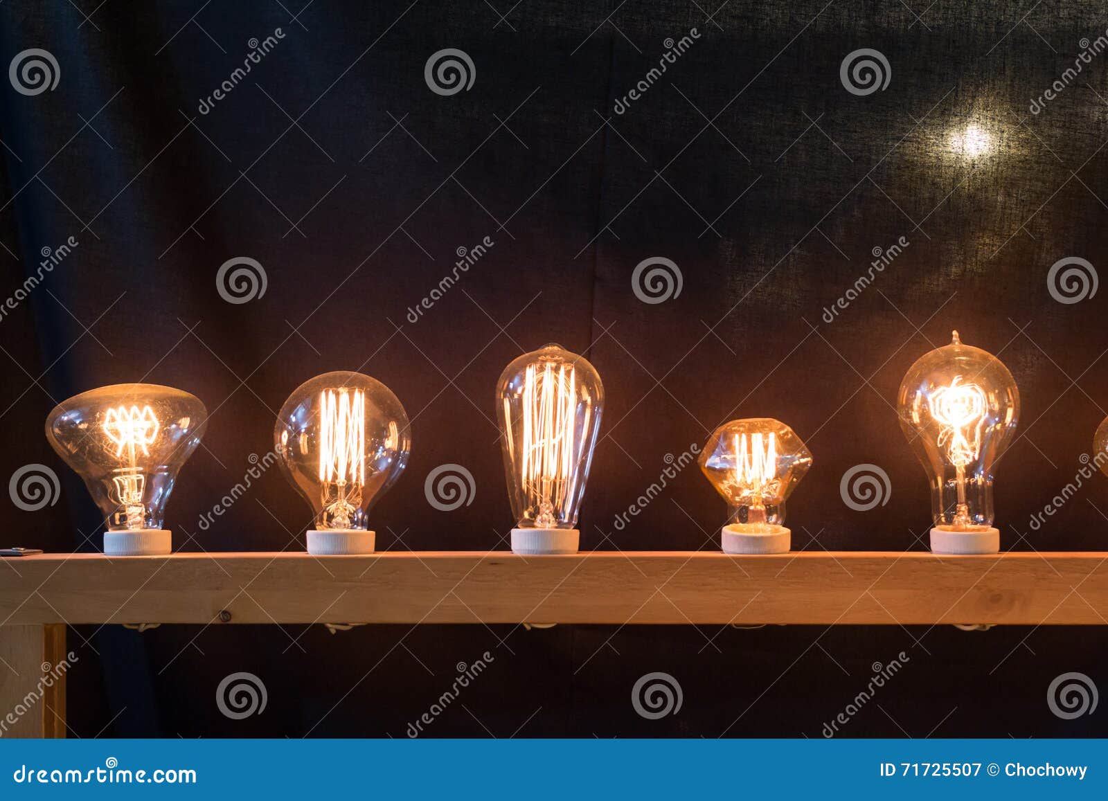 Glow Yellow Design Light Bulbs in Black Stock Image - Image of glass ...