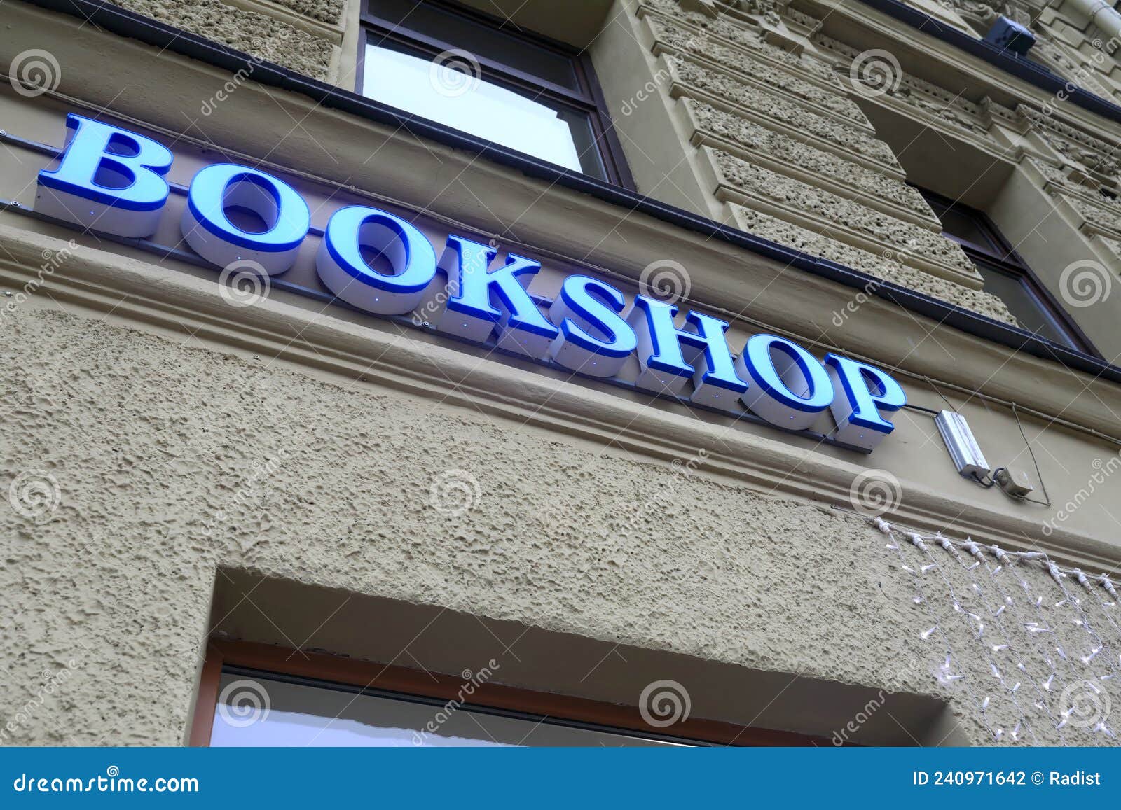 Glowing Bookshop Sign Board on Wall Stock Photo - Image of icon, glow ...