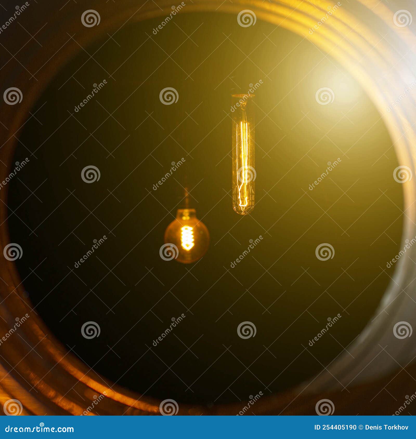 Glowing Bulbs with Edison Filament Visible from the Ventilation Duct ...