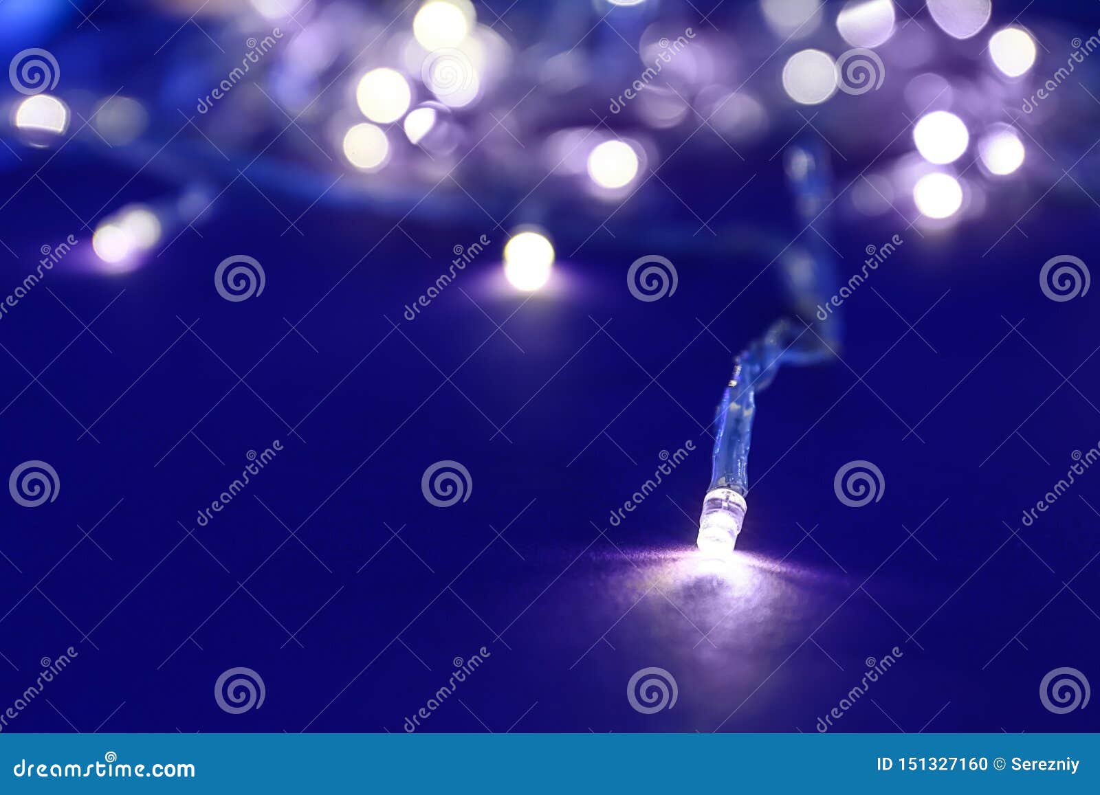 Glowing Christmas Lights on Color Background Stock Photo - Image of ...