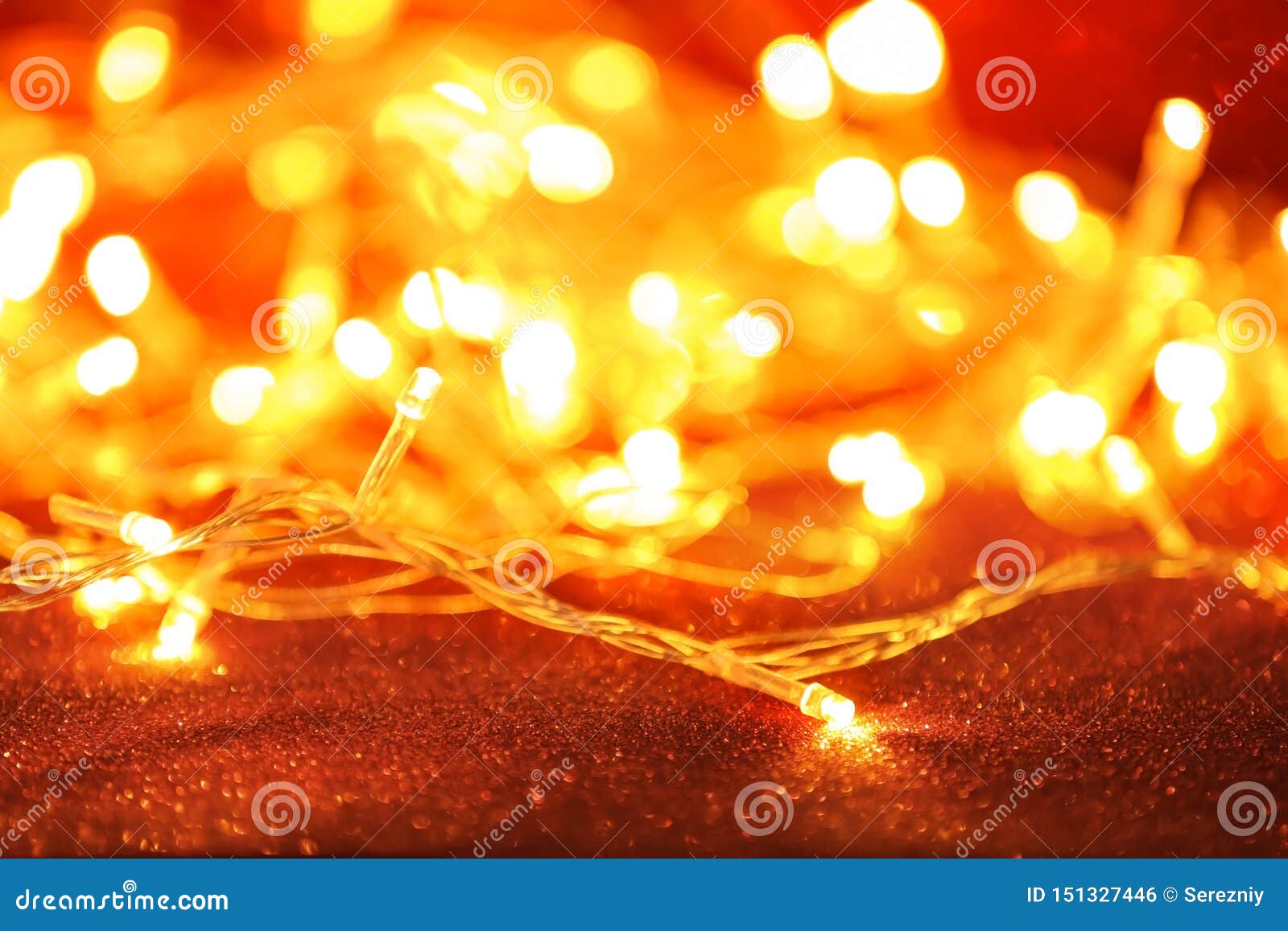 Glowing Christmas Lights on Color Background Stock Photo - Image of ...