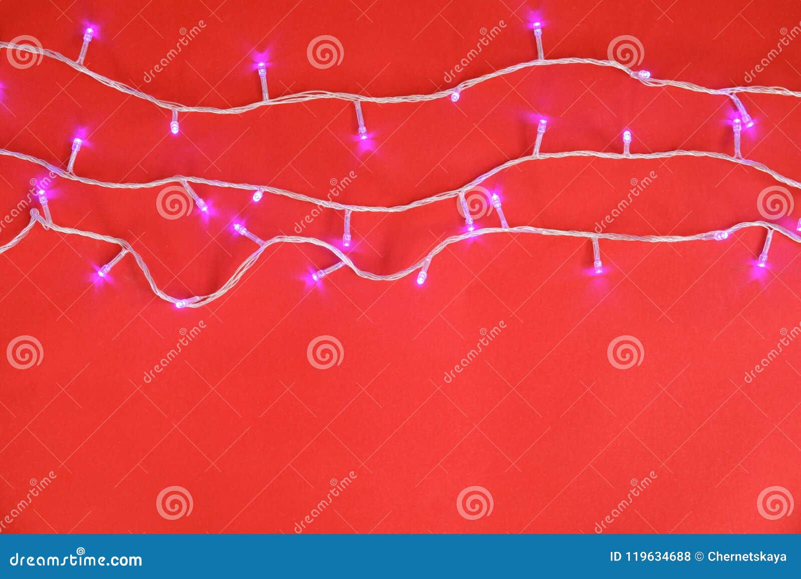 Glowing Christmas Lights on Color Background Stock Photo - Image of ...