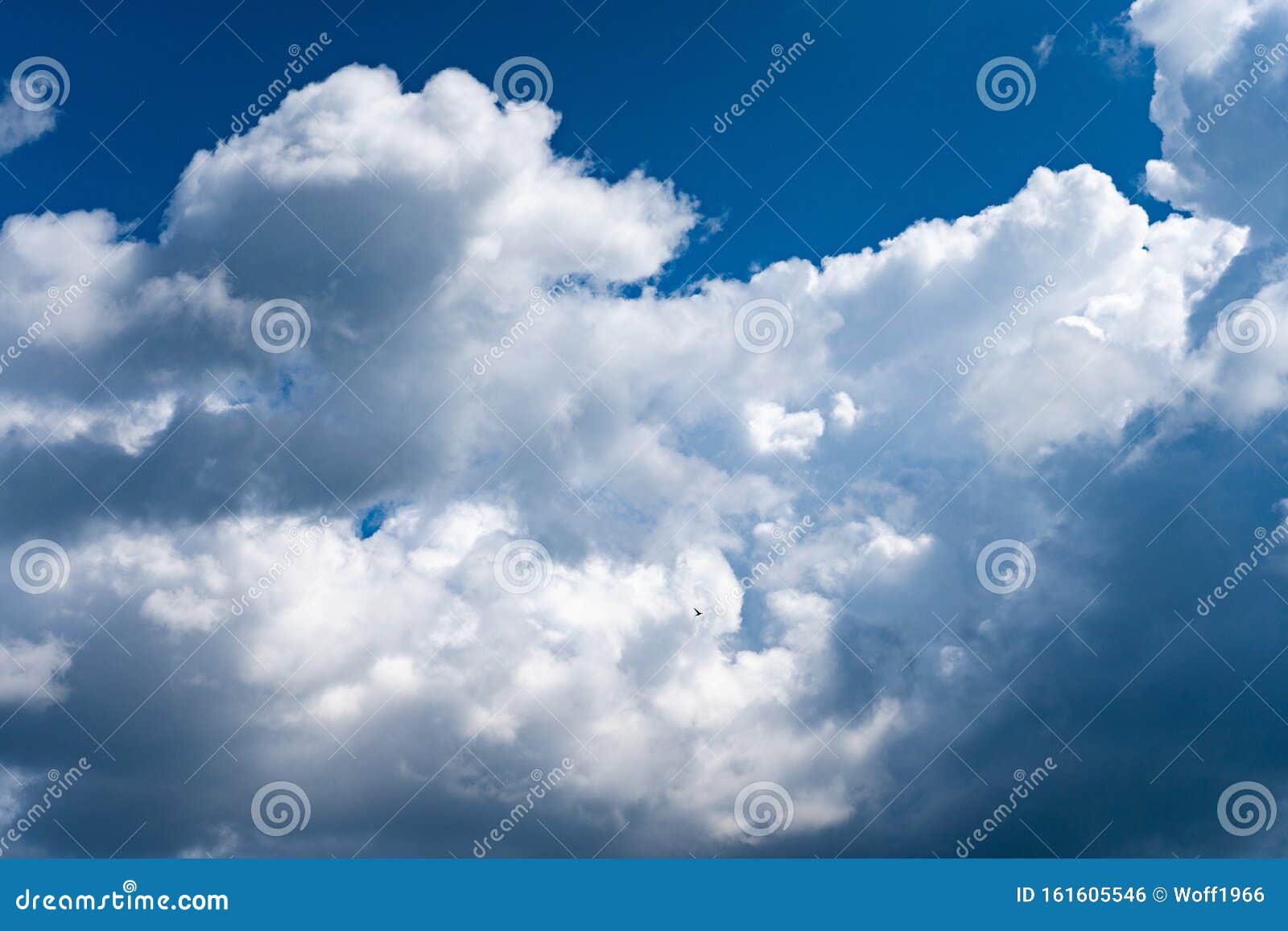Glowing Clouds on a Background of Blue Sky. White Fluffy Luminous Cloud ...
