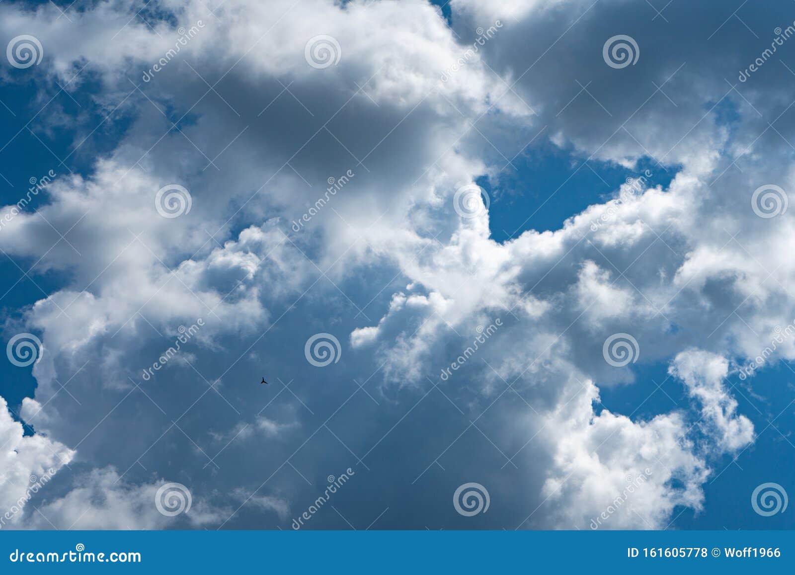 Glowing Clouds on a Background of Blue Sky. White Fluffy Luminous Cloud ...