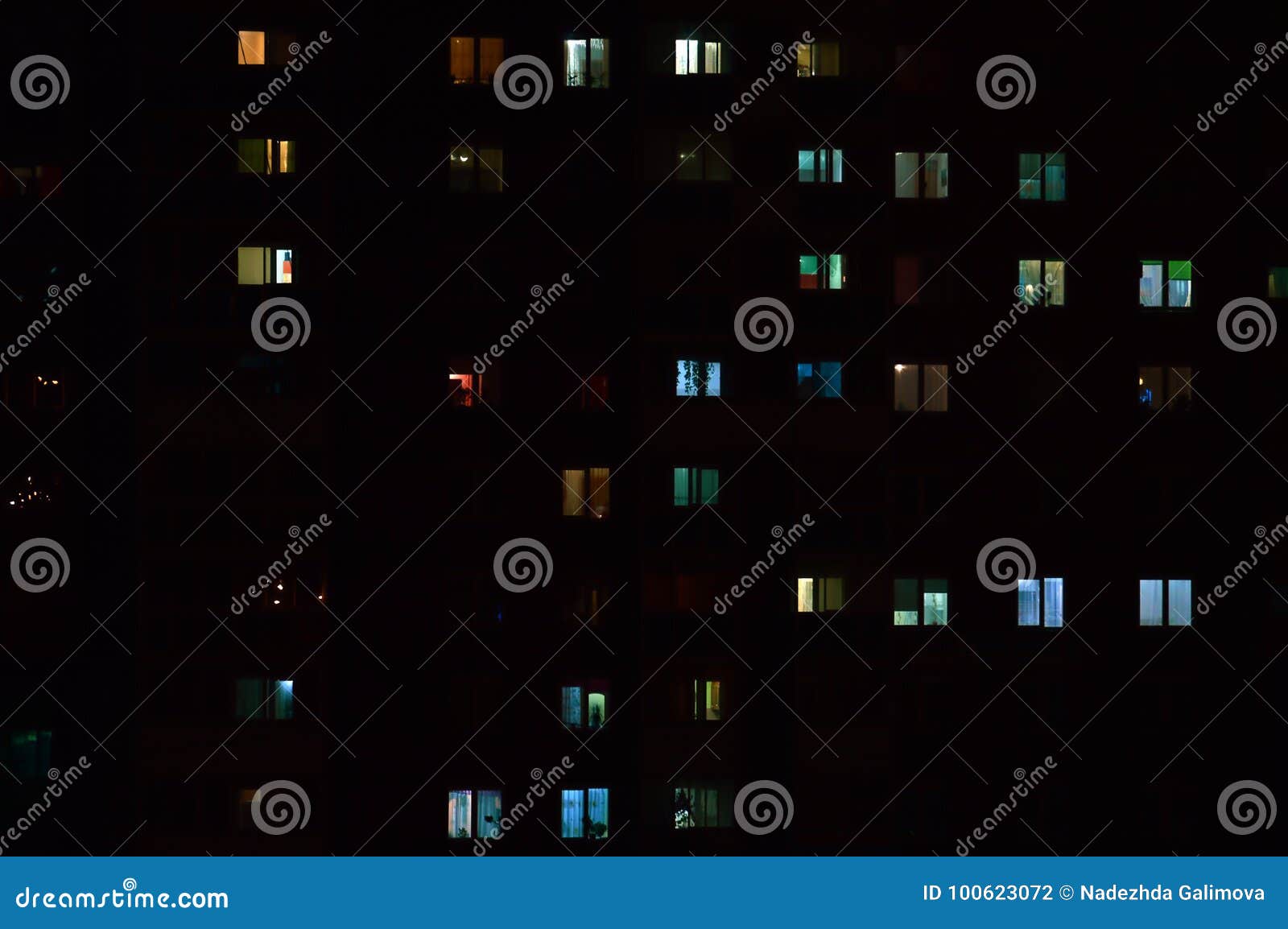 Glowing Evening Windows of a Multistory Building. the Elements of the ...