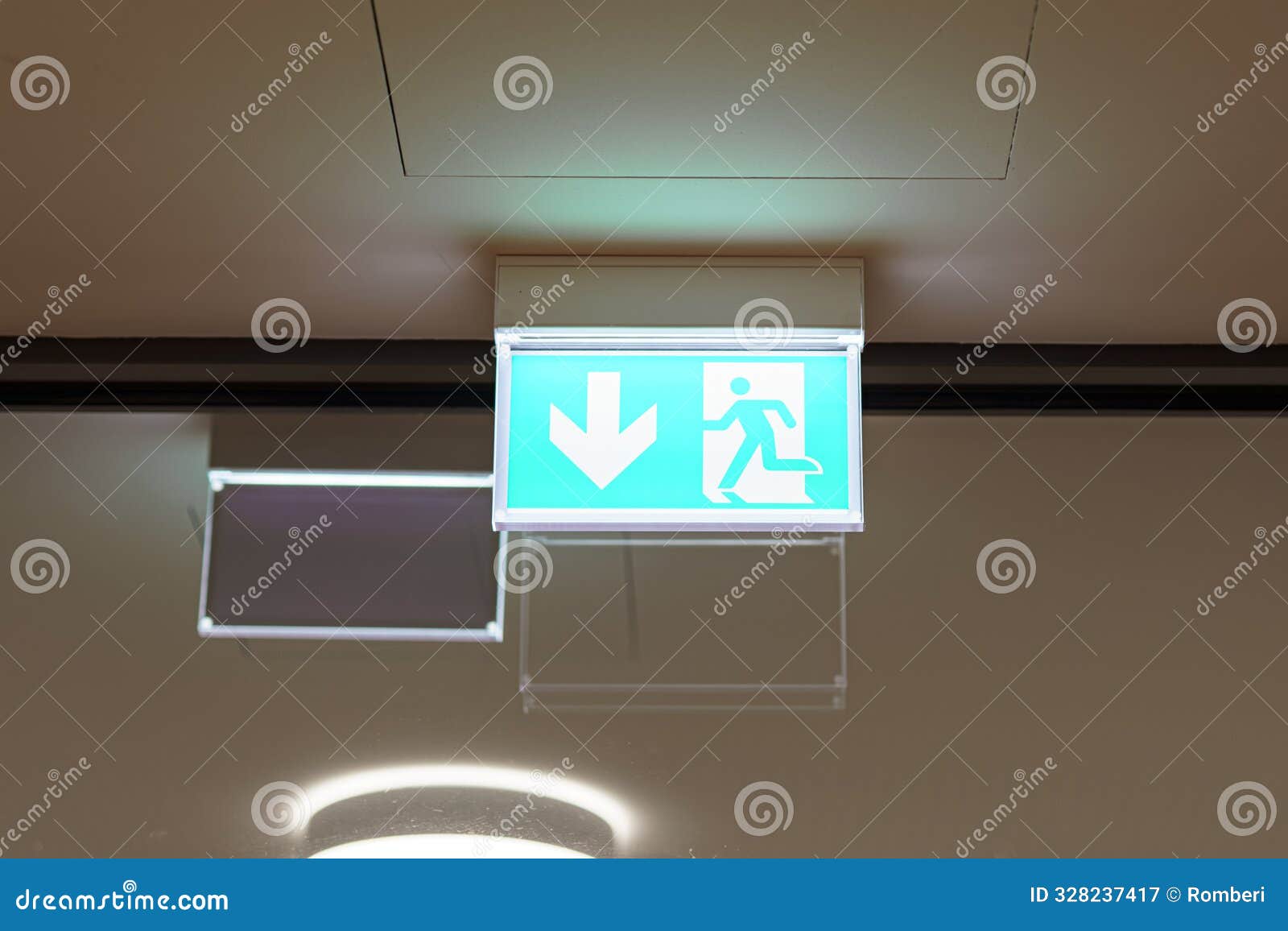 Glowing Exit Sign on the Ceiling in the Corridor Stock Image - Image of ...