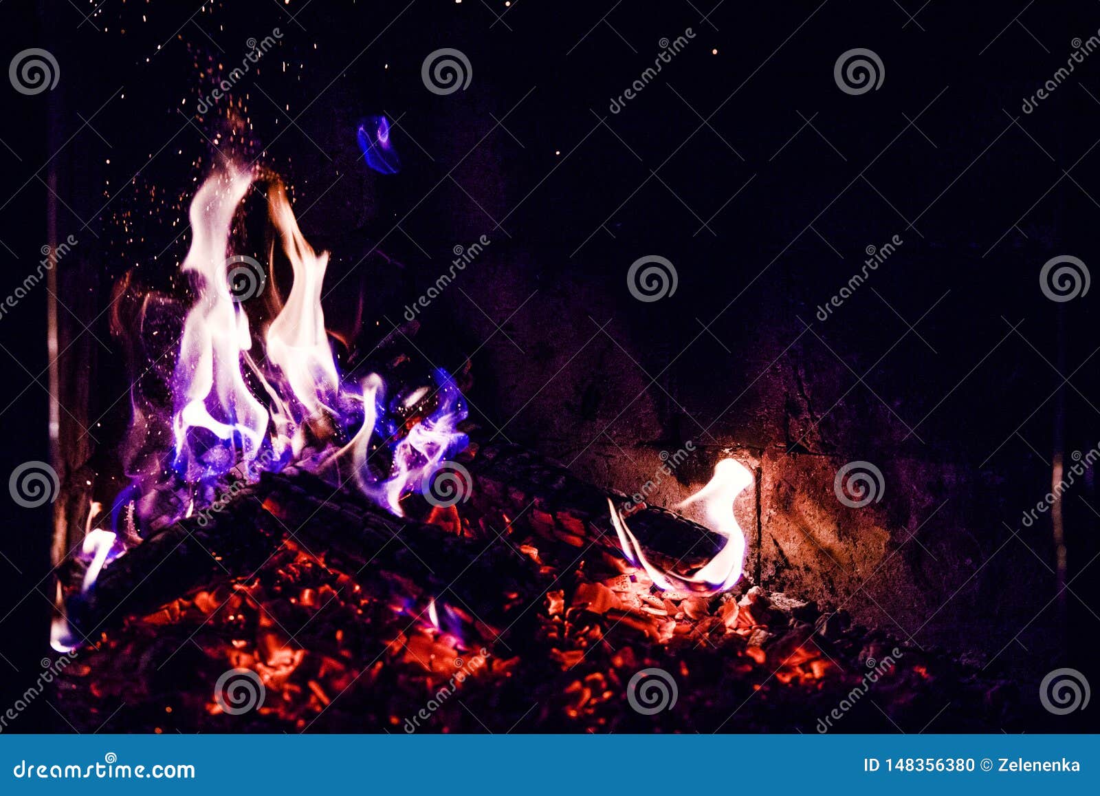 Glowing fire in fireplace stock photo. Image of year - 148356380