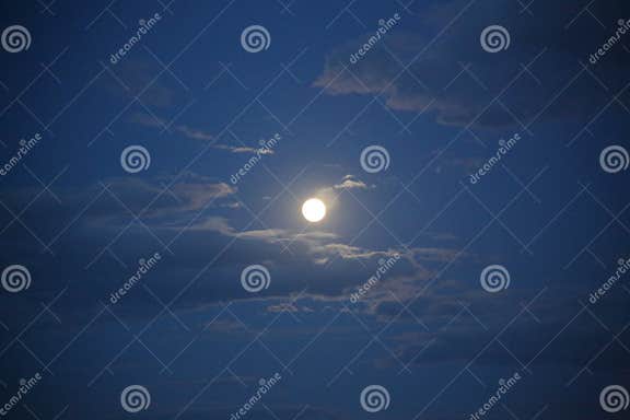 Glowing Full Moon Up in the Cloudy Sky Stock Image - Image of moon ...