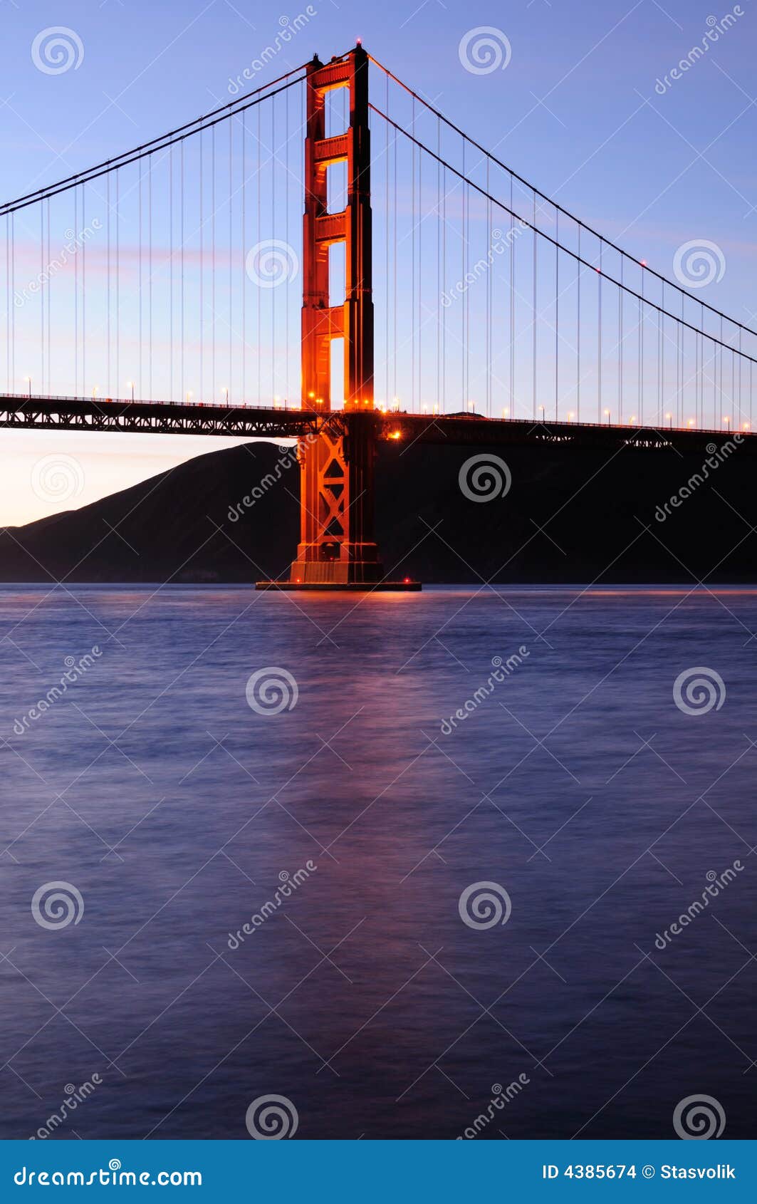 Glowing Golden Gate Bridge Tower at Sunset Stock Photo - Image of ...