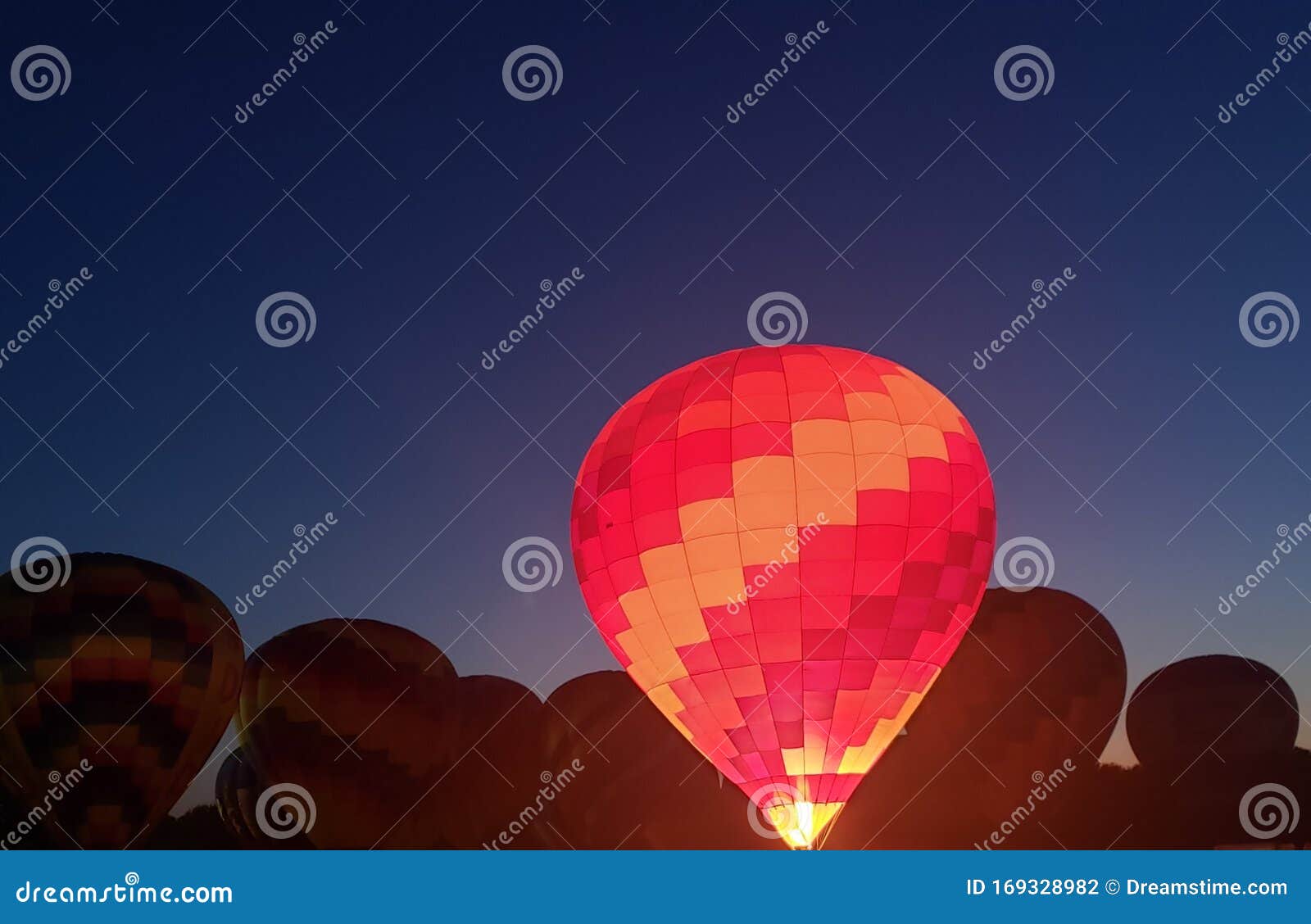 Glowing Hot Air Balloon Ride Night Stock Photo - Image of balloon ...