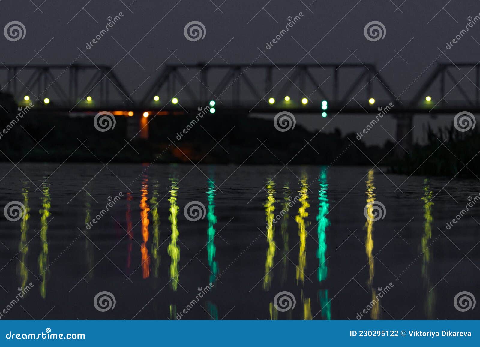 Glowing Lanterns are Reflected in the Dark Waters of the River and ...