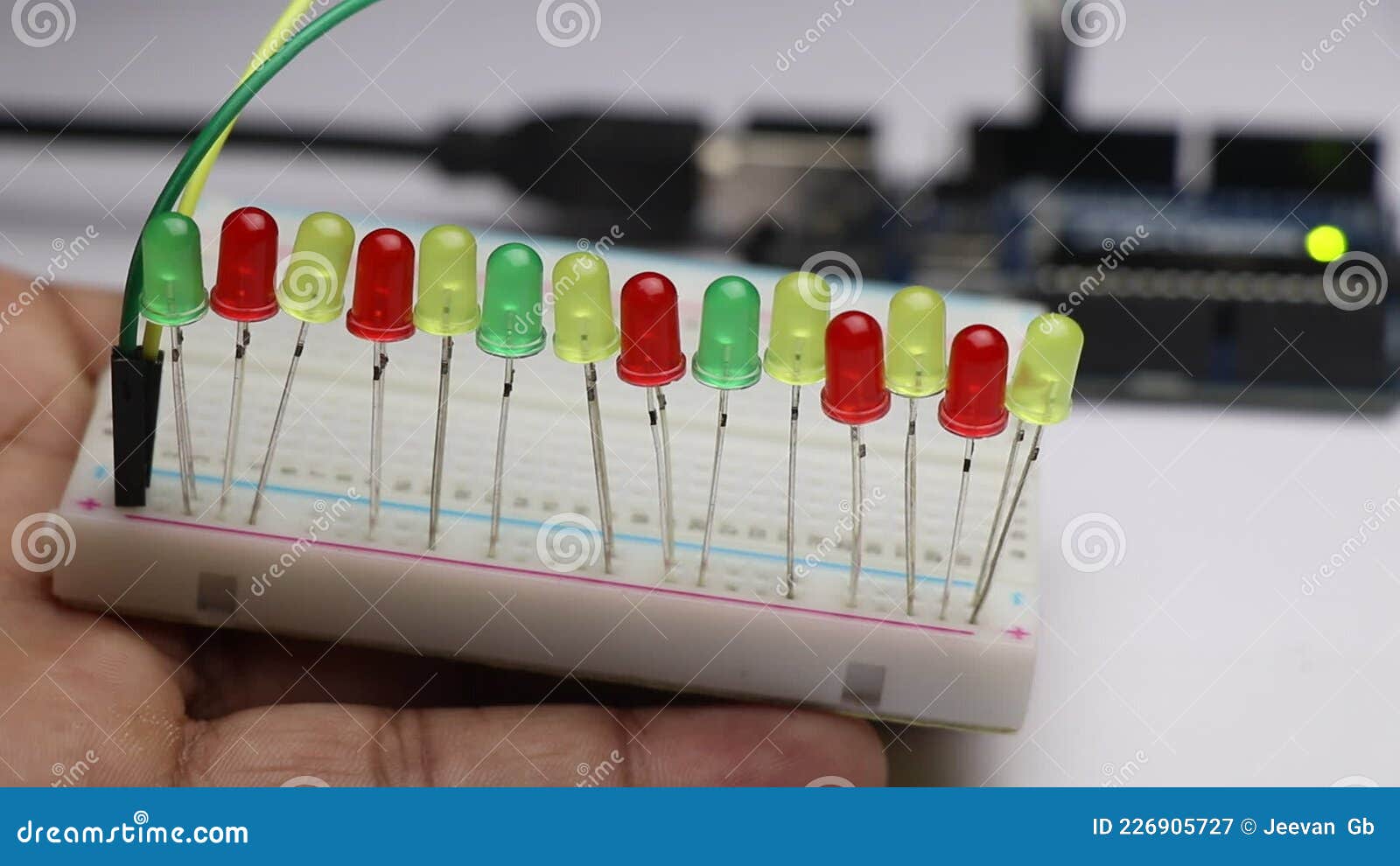 Glowing LED Bulbs Connected To Breadboard Controlled by Micro ...