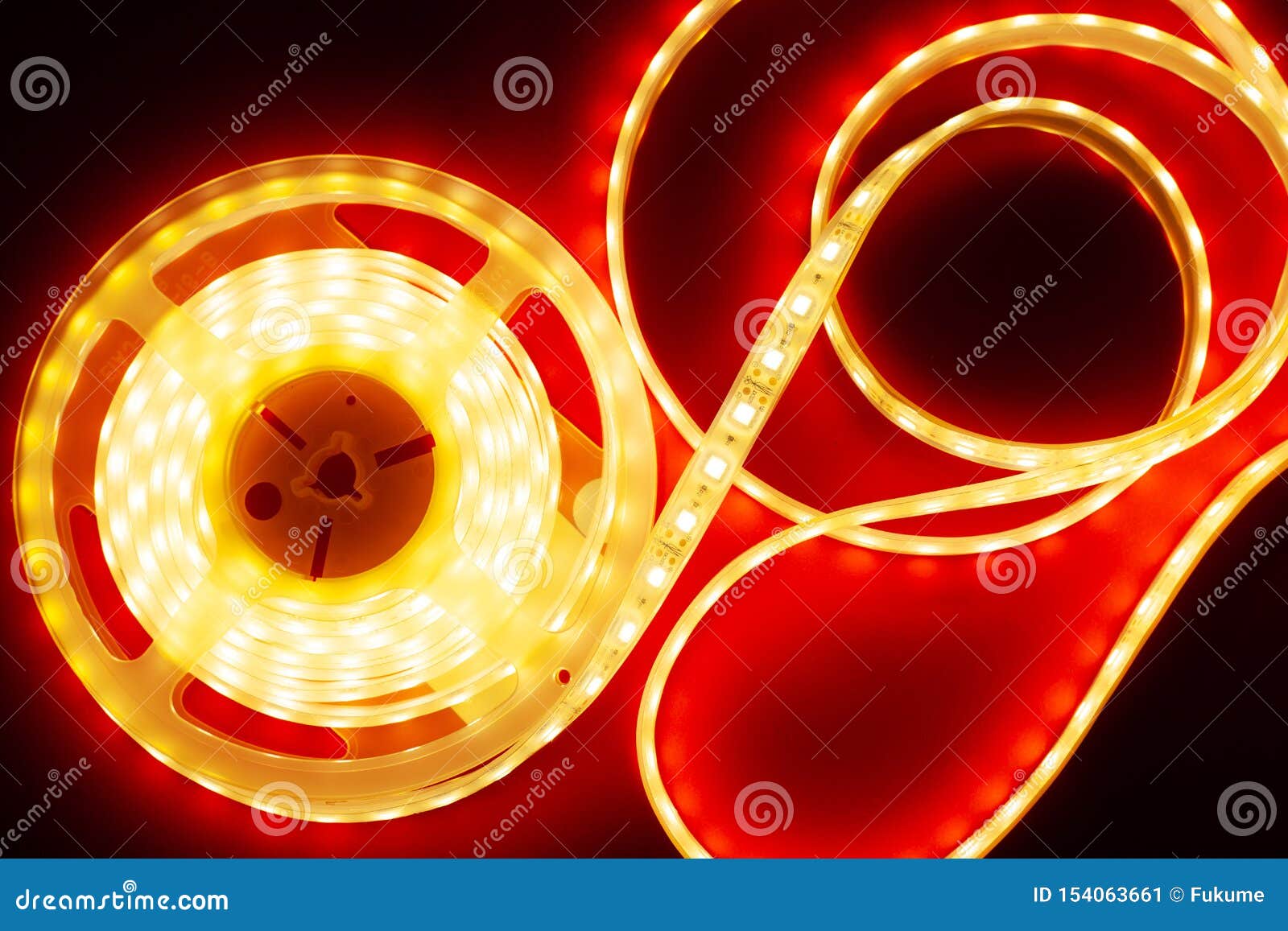 Glowing LED Strip on a Red Background, Copy Space Top View Led Light ...