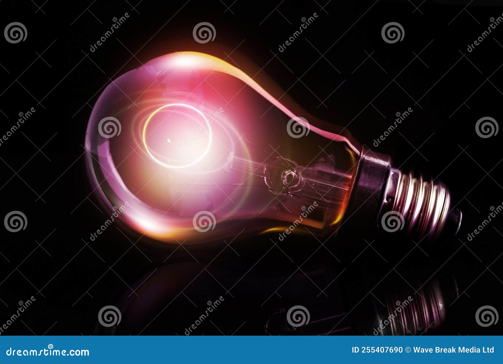 Glowing light bulb stock photo. Image of light, dark - 255407690