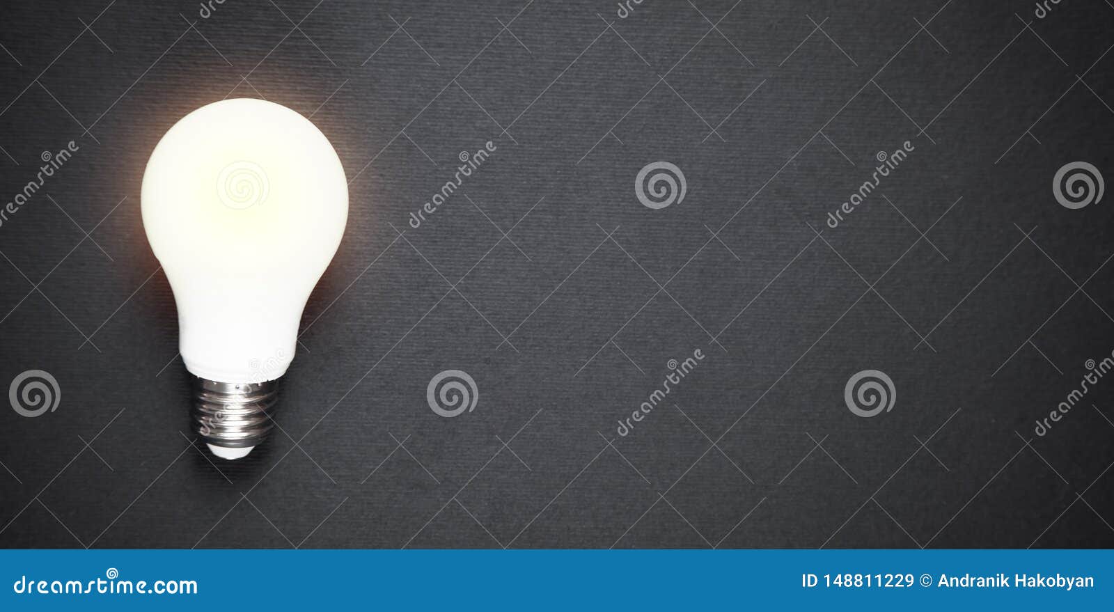 Glowing Light Bulb in the Black Background Stock Image - Image of ...