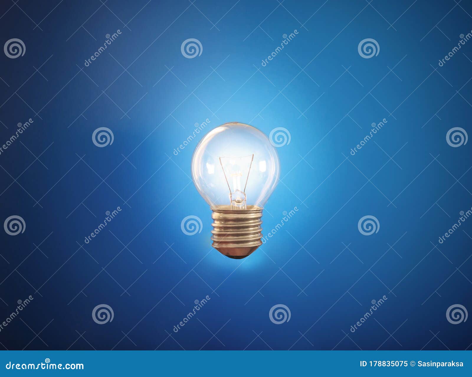 Glowing Light Bulb, on Blue Background Stock Image - Image of glowing ...