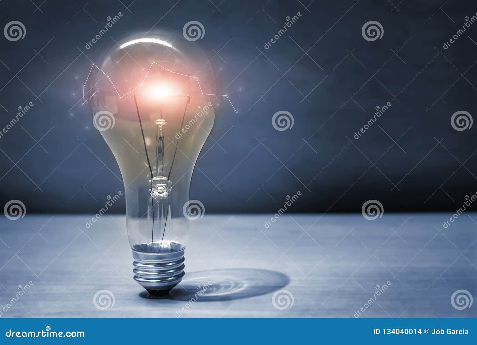 Glowing Light Bulb with Blue Background Stock Photo - Image of bulb ...