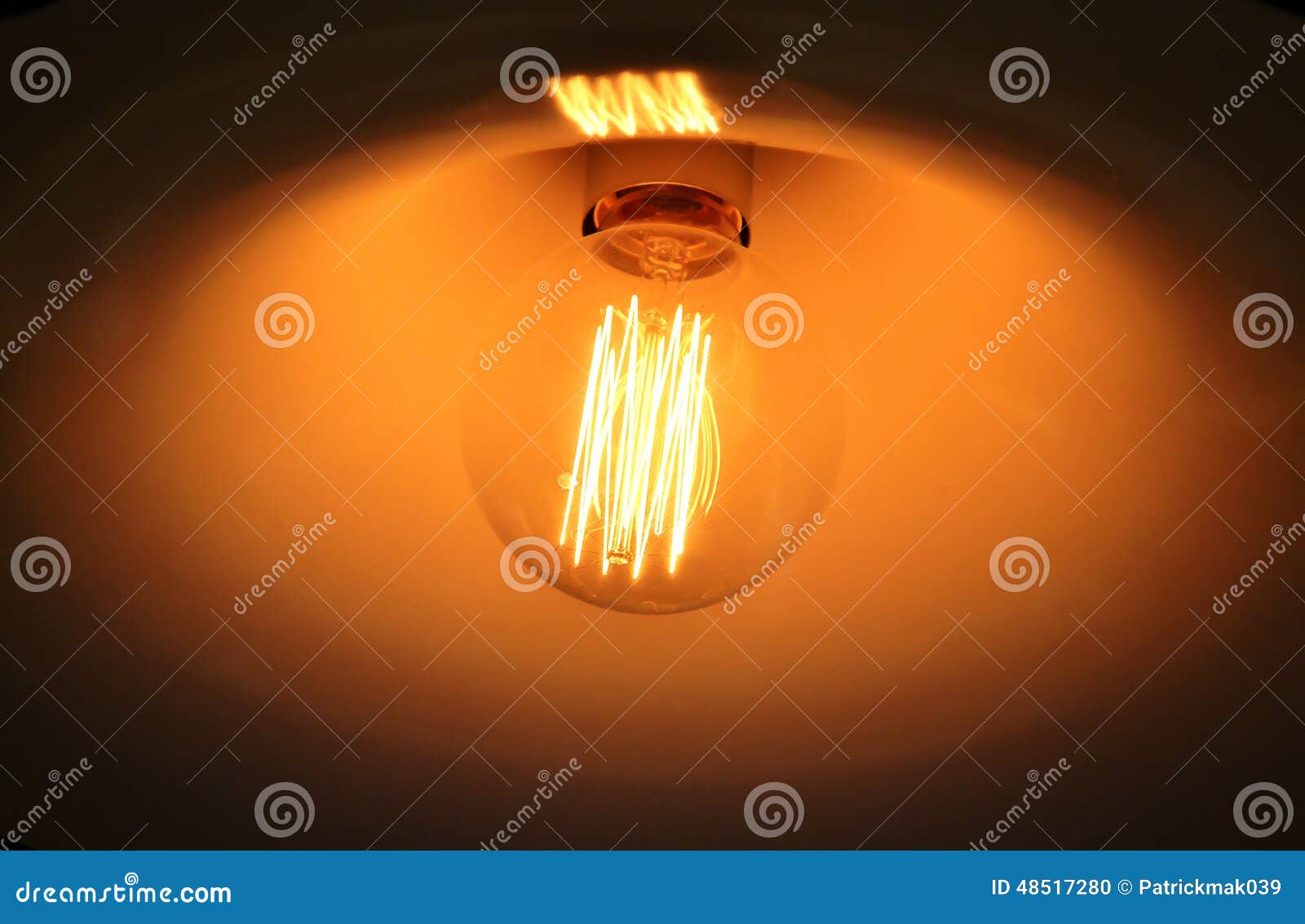 Glowing light bulb stock photo. Image of tungsten, edison - 48517280