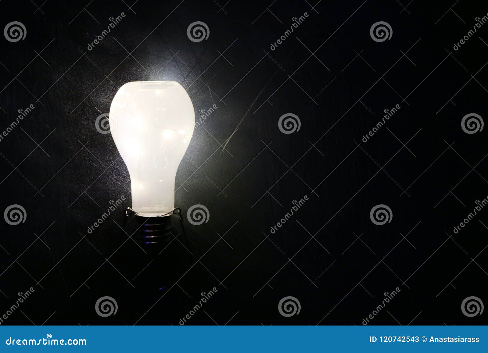 Glowing Lightbulb on Black Background Stock Image - Image of energy ...