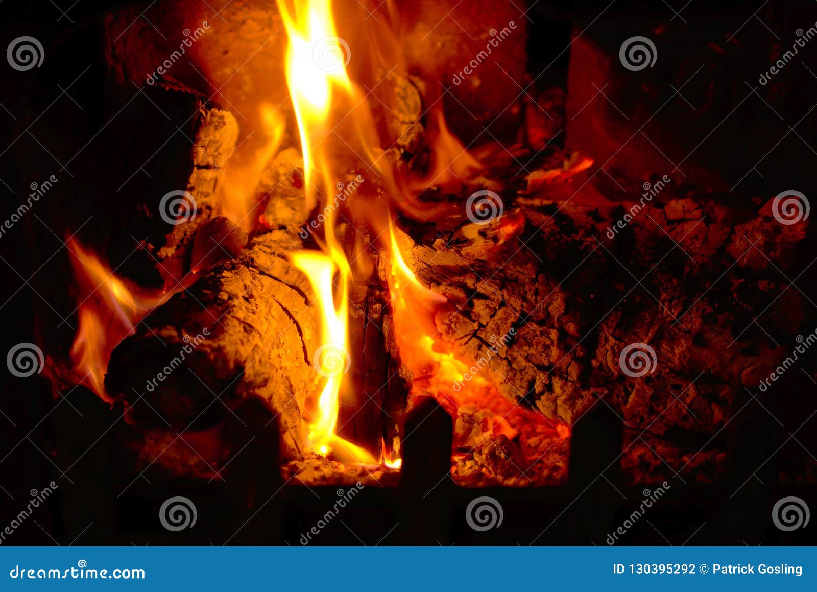Warmth of a log fire. stock photo. Image of flicker - 130395292