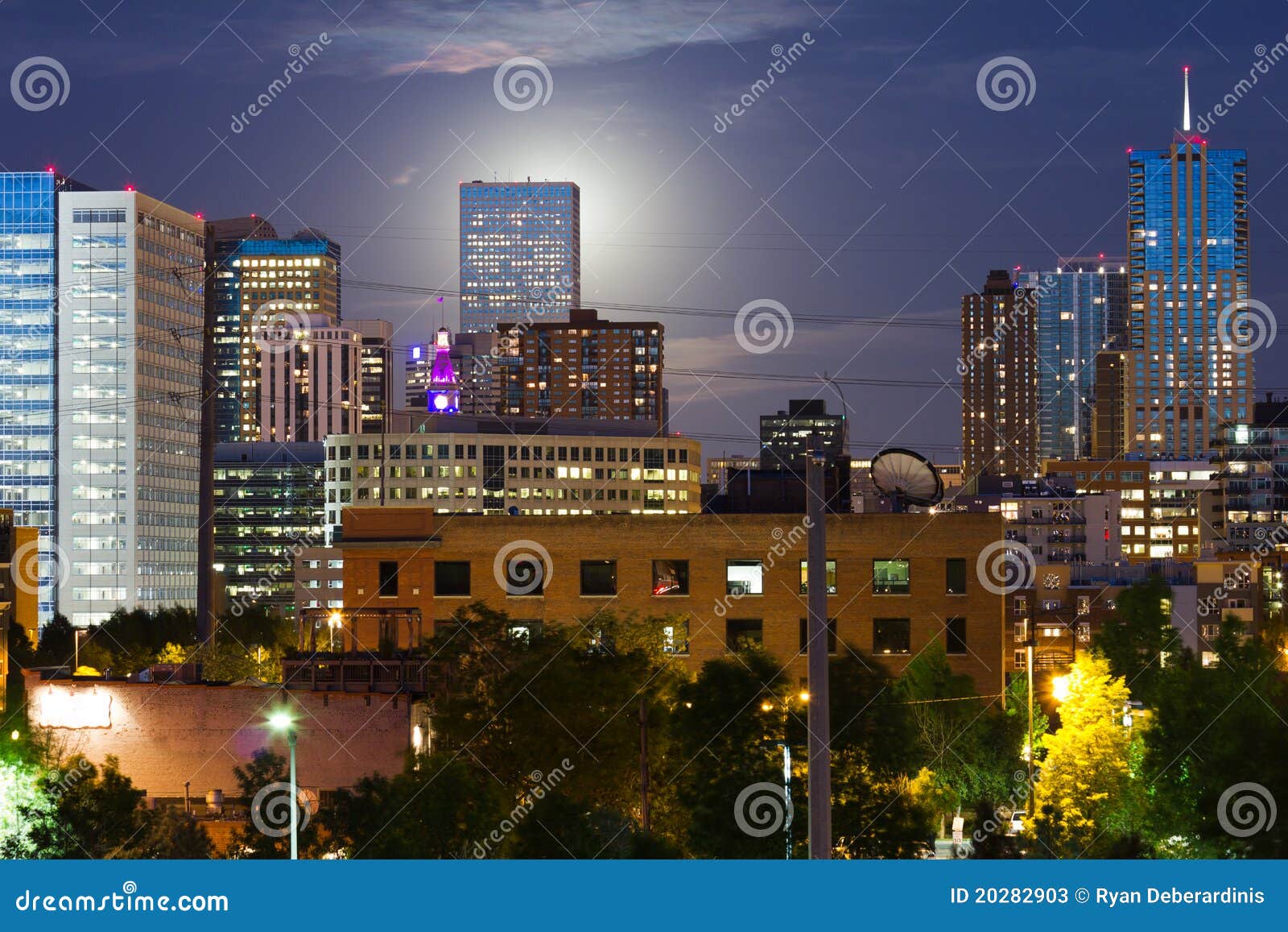 Glowing Moon Rises Behind the Denver Skyline Stock Image - Image of ...
