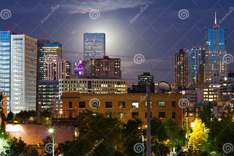 Glowing Moon Rises Behind the Denver Skyline Stock Image - Image of ...