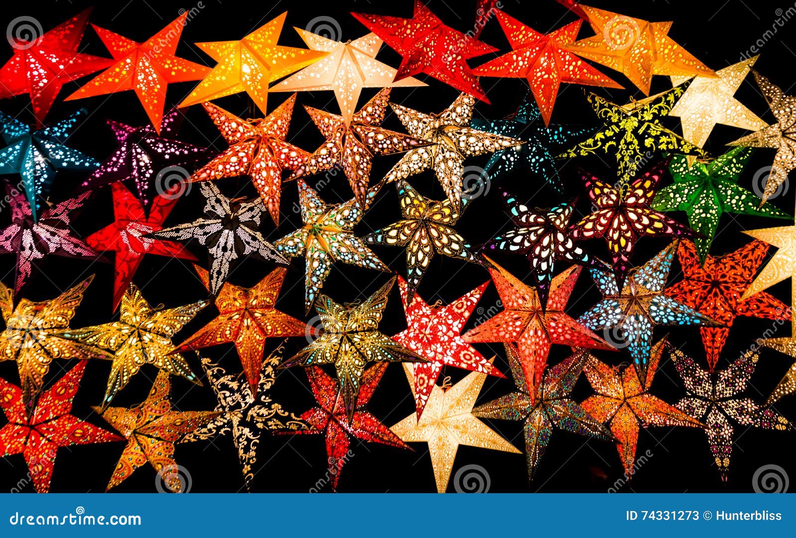 Glowing Paper Star Christmas Decorations in Black Background Stock ...