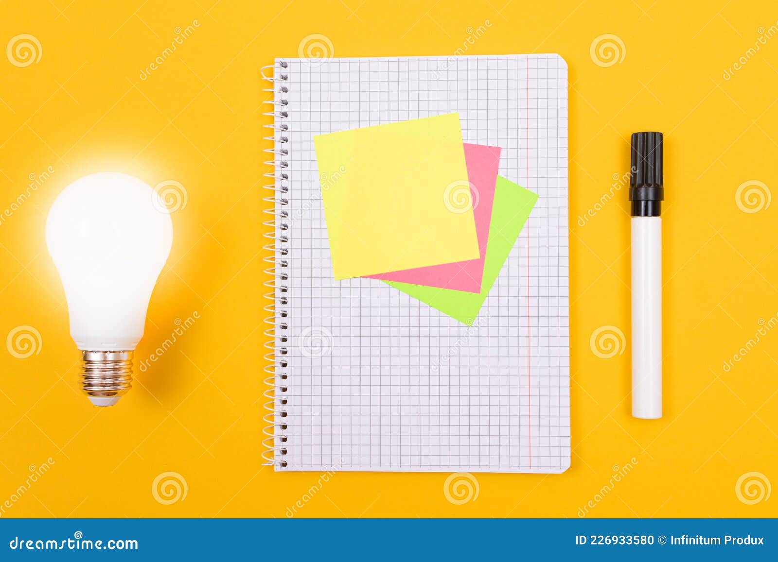 Glowing Power Saving Lamp and Notepad with Sticky Notes Stock Photo ...
