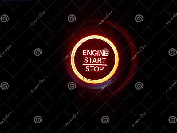 Glowing Red Engine Start Stop Light and Black Background Stock Photo ...