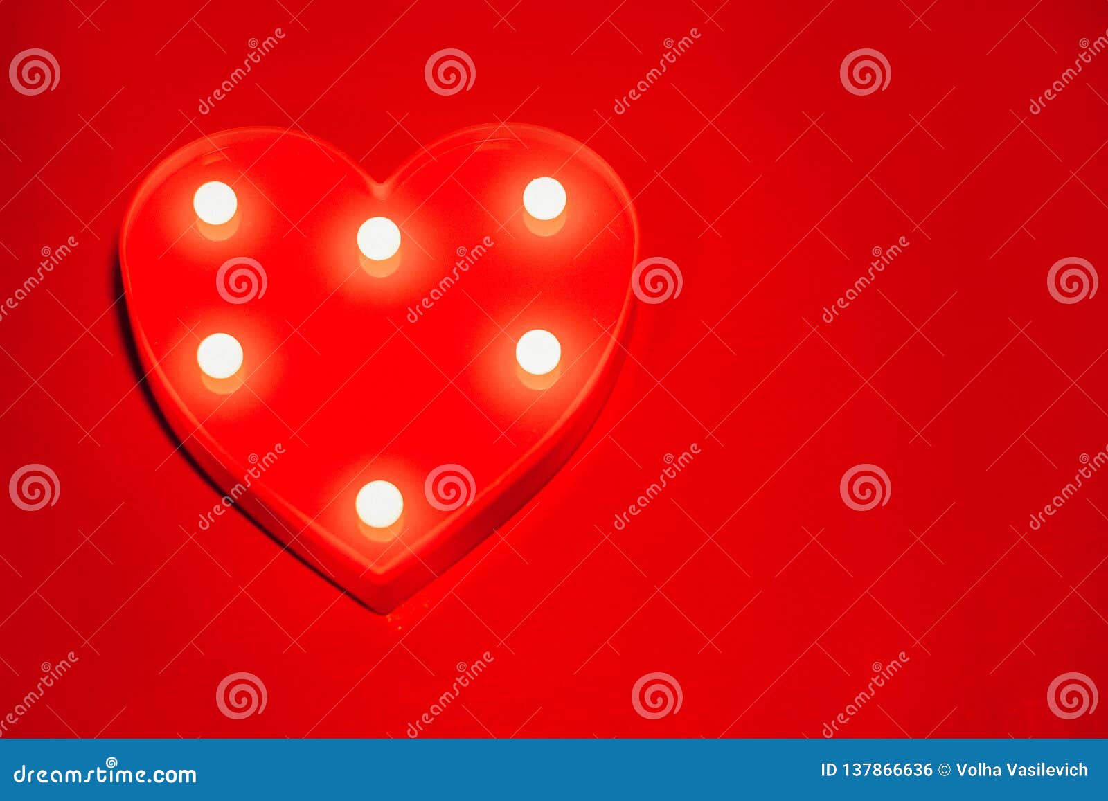 Glowing Red Heart with Flashlights on the Red Background Closeupr Stock ...