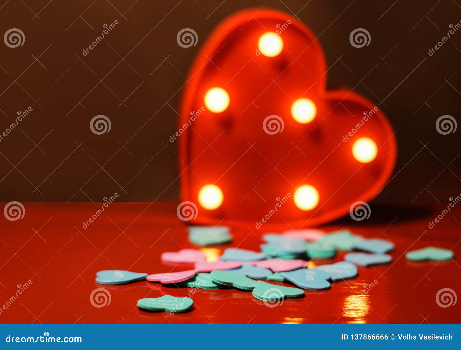 Glowing Red Heart with Flashlights on the Red Background Closeupr Stock ...
