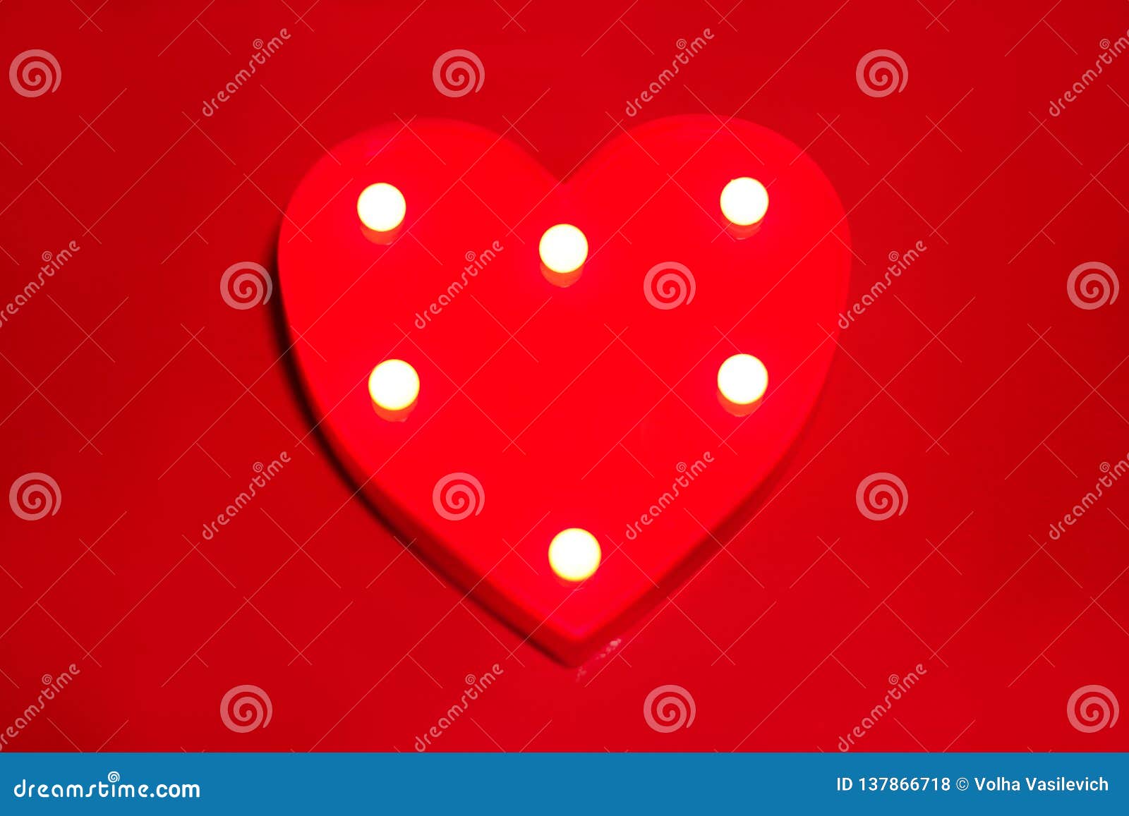 Glowing Red Heart with Flashlights on the Red Background Closeupr Stock ...