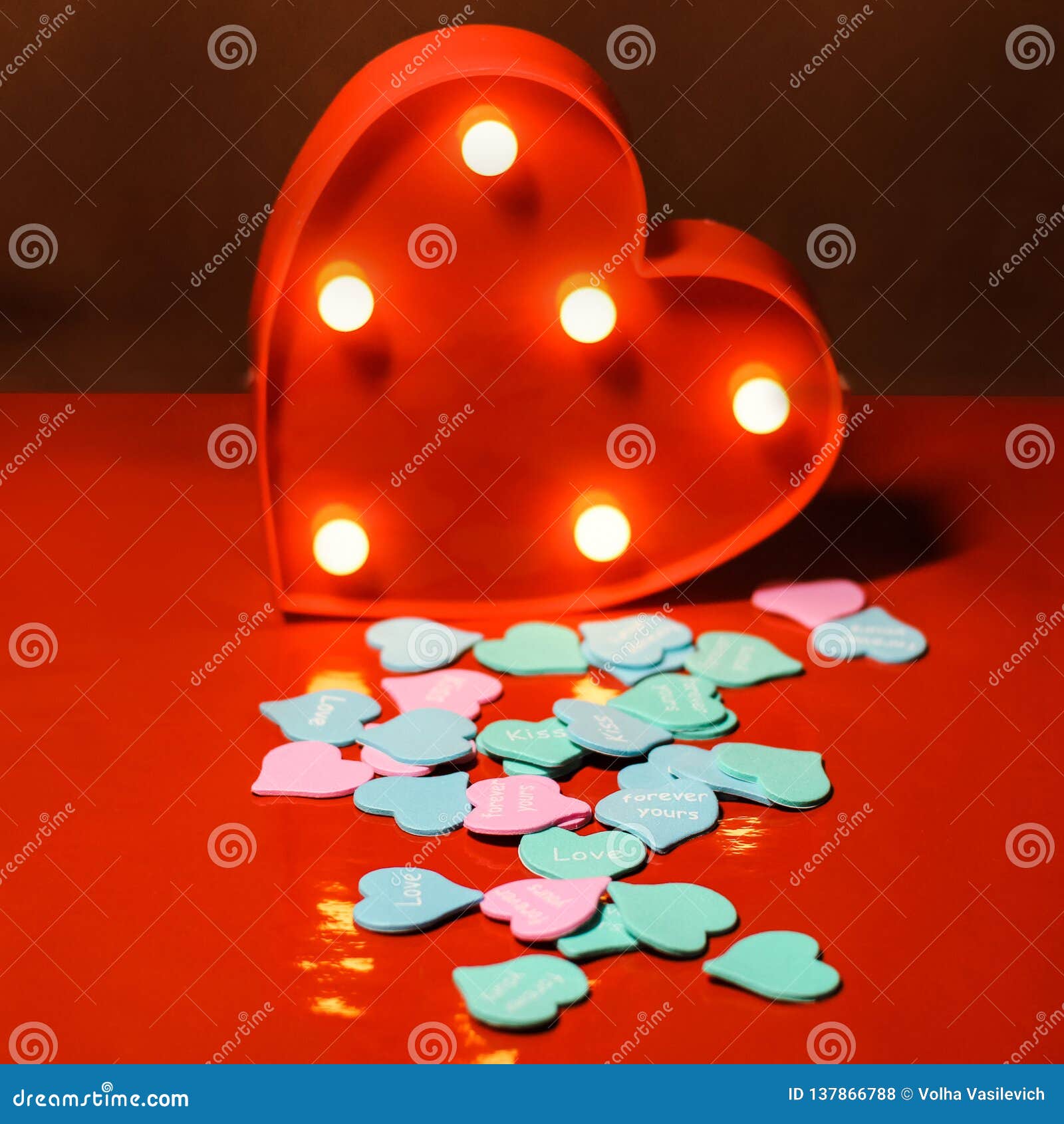 Glowing Red Heart with Flashlights on the Red Background Closeupr Stock ...